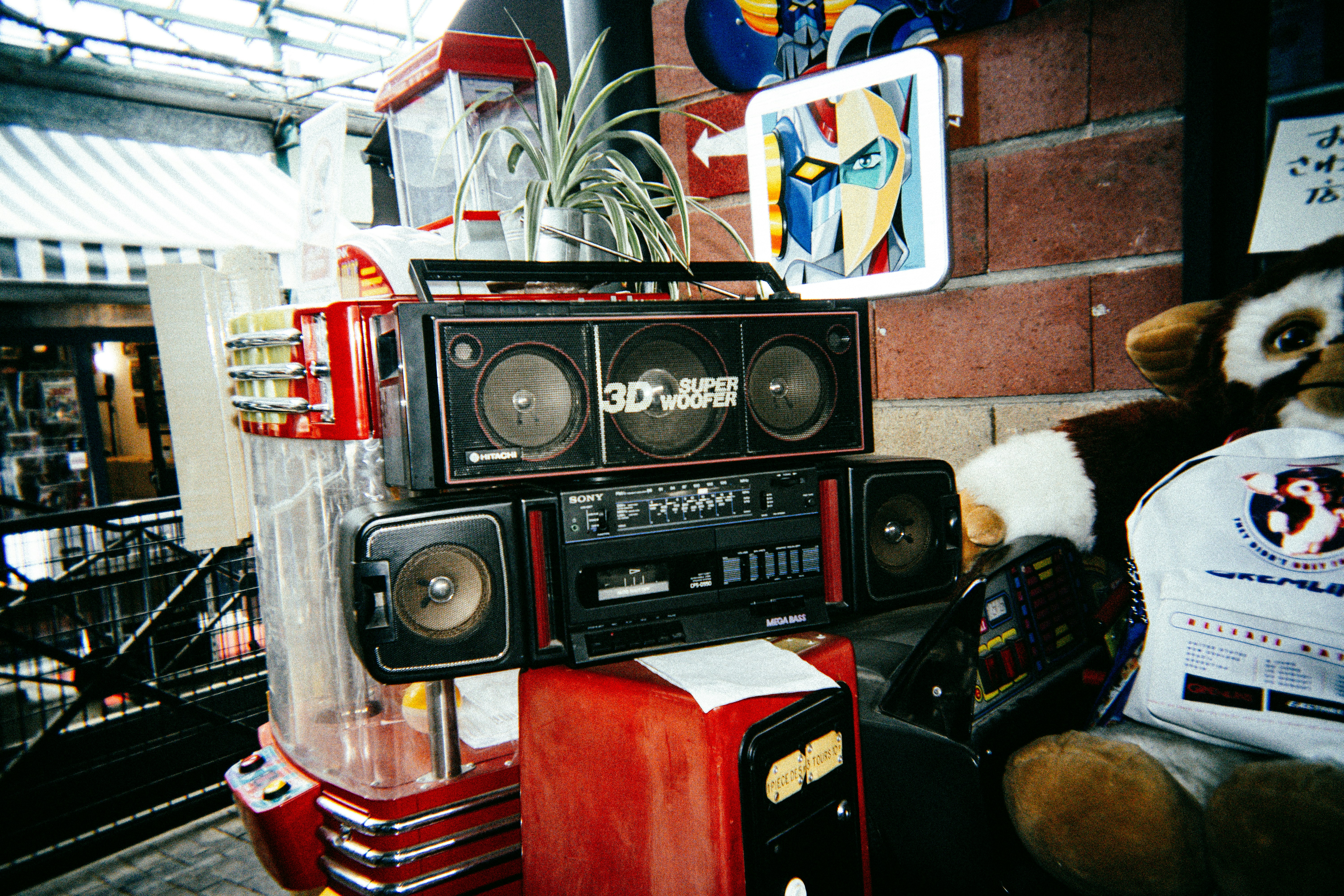 Retro Boom Box Parade: A Street Corner Speaker Stack with Plush Bear