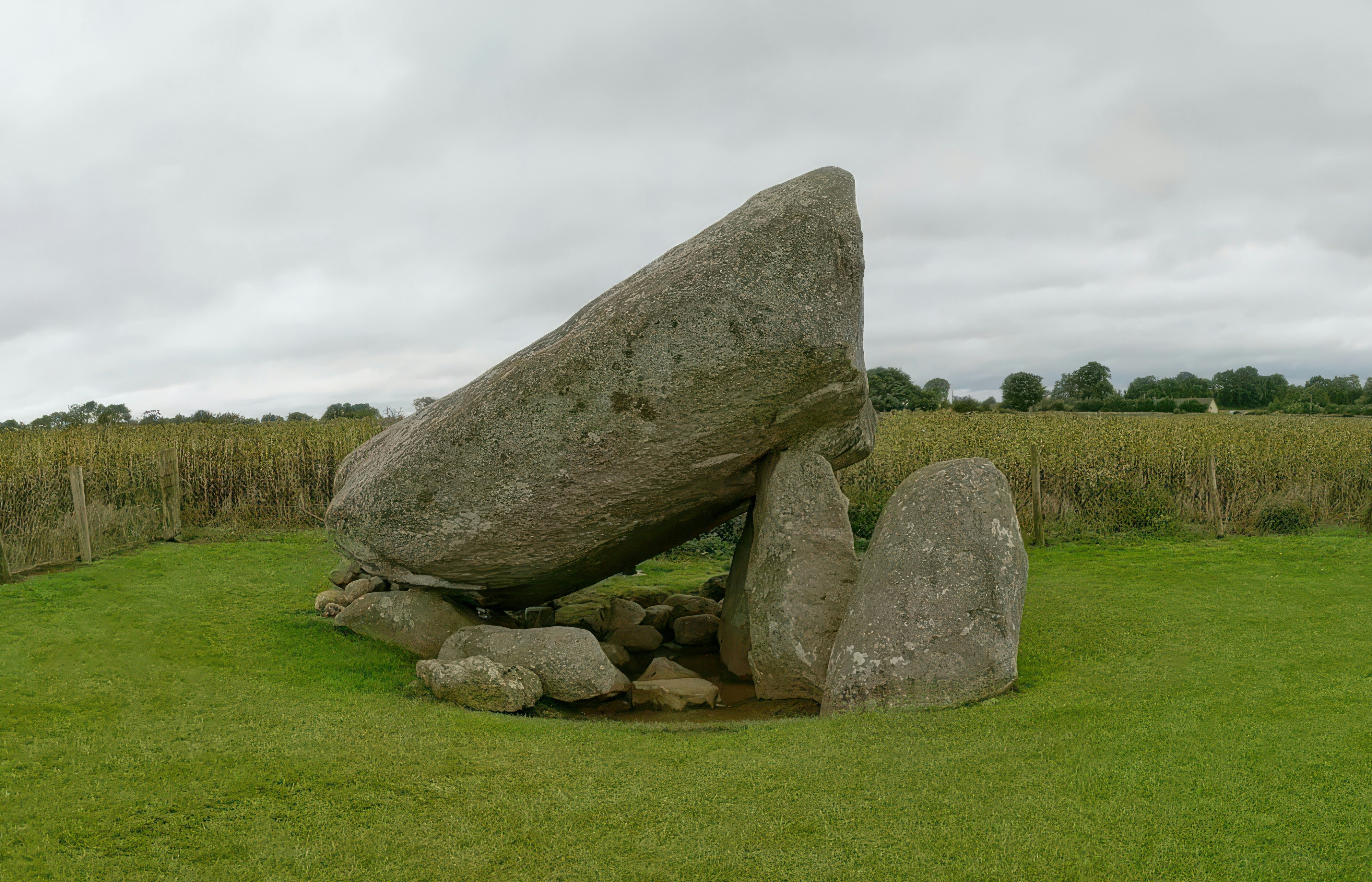 Balanced Stone Ring: A Lone Megalith Resting on a Green Turf