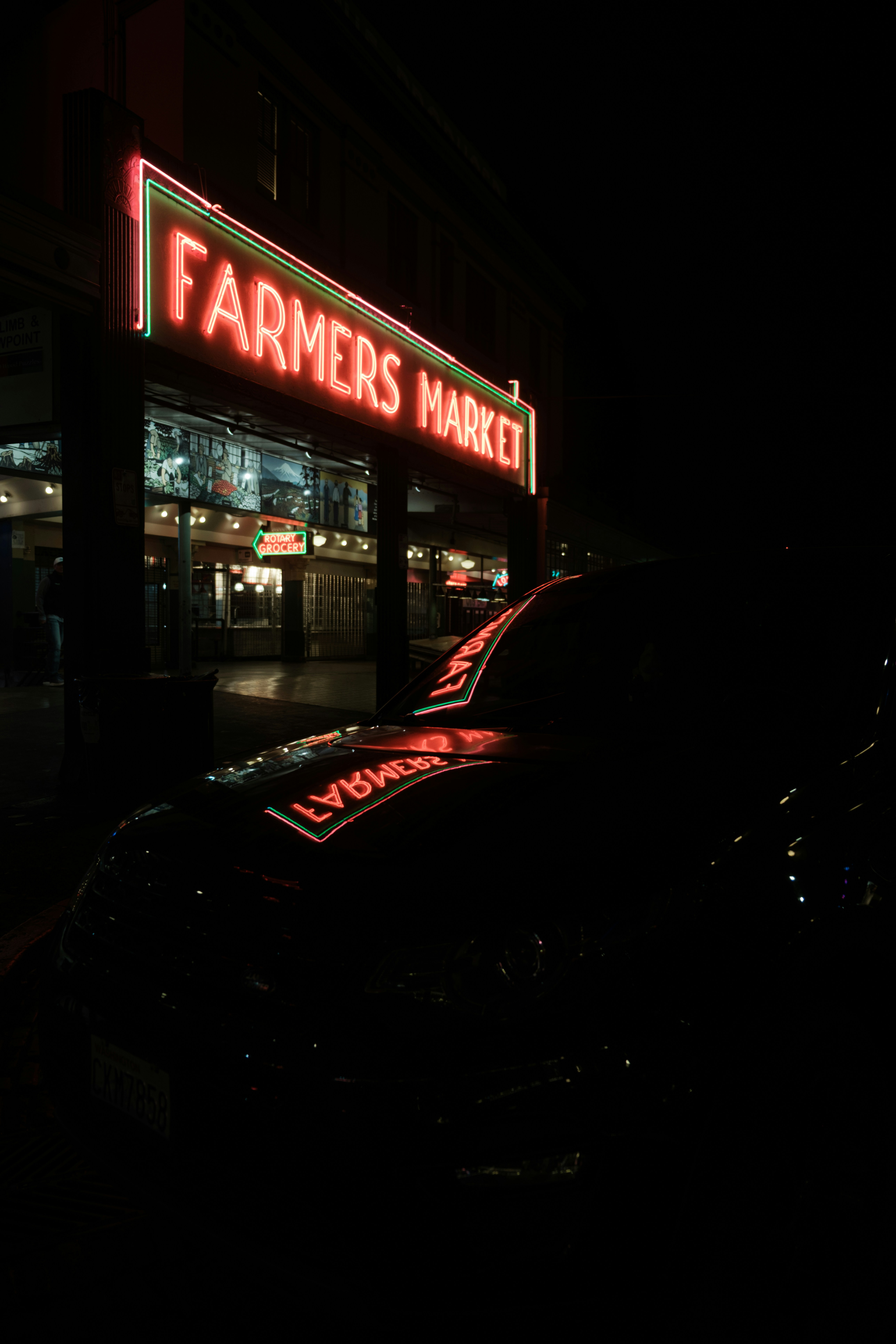 Neon Farm Market Under Night Sky