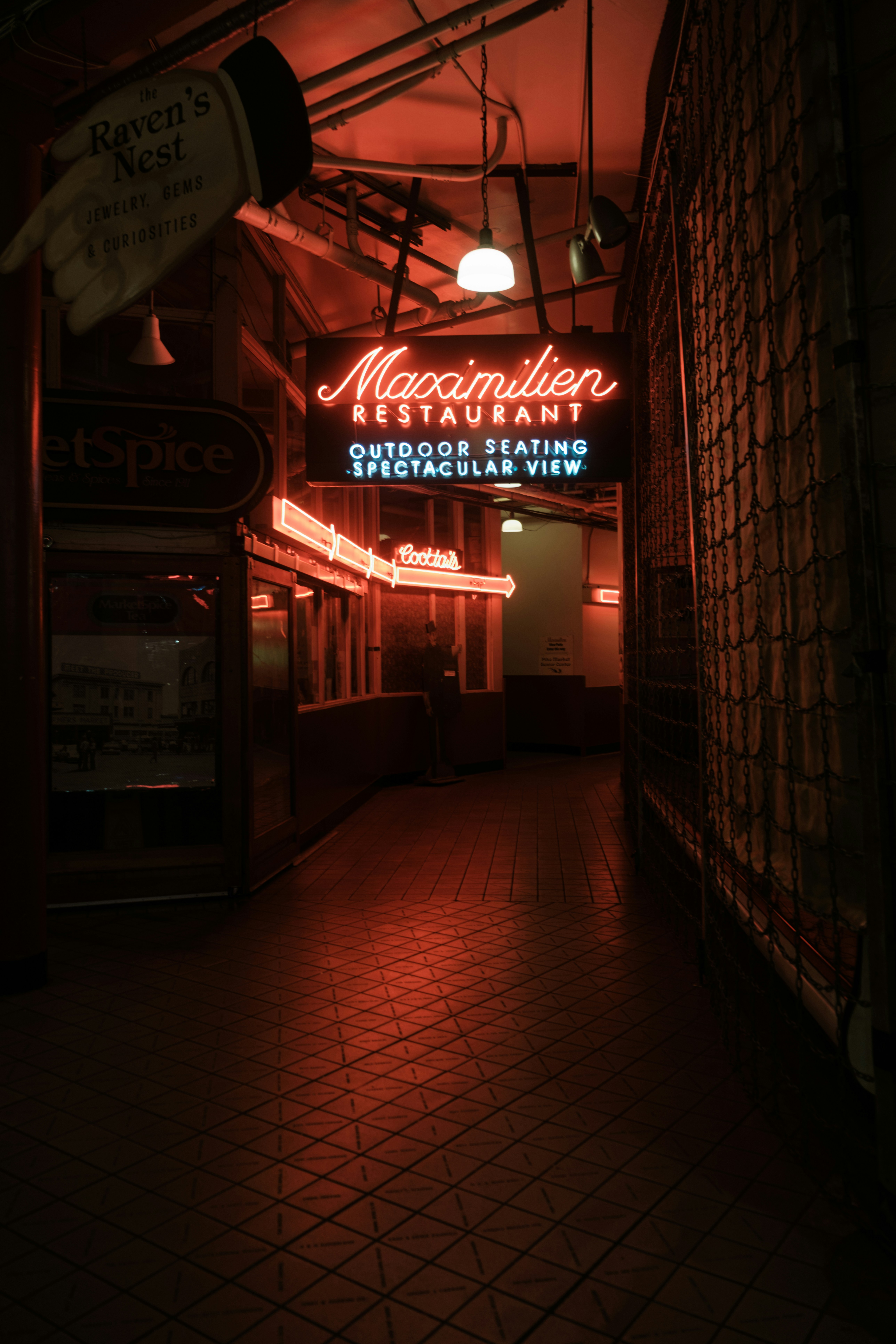 Neon Gateway: Red Illuminations in a Quiet Arcade