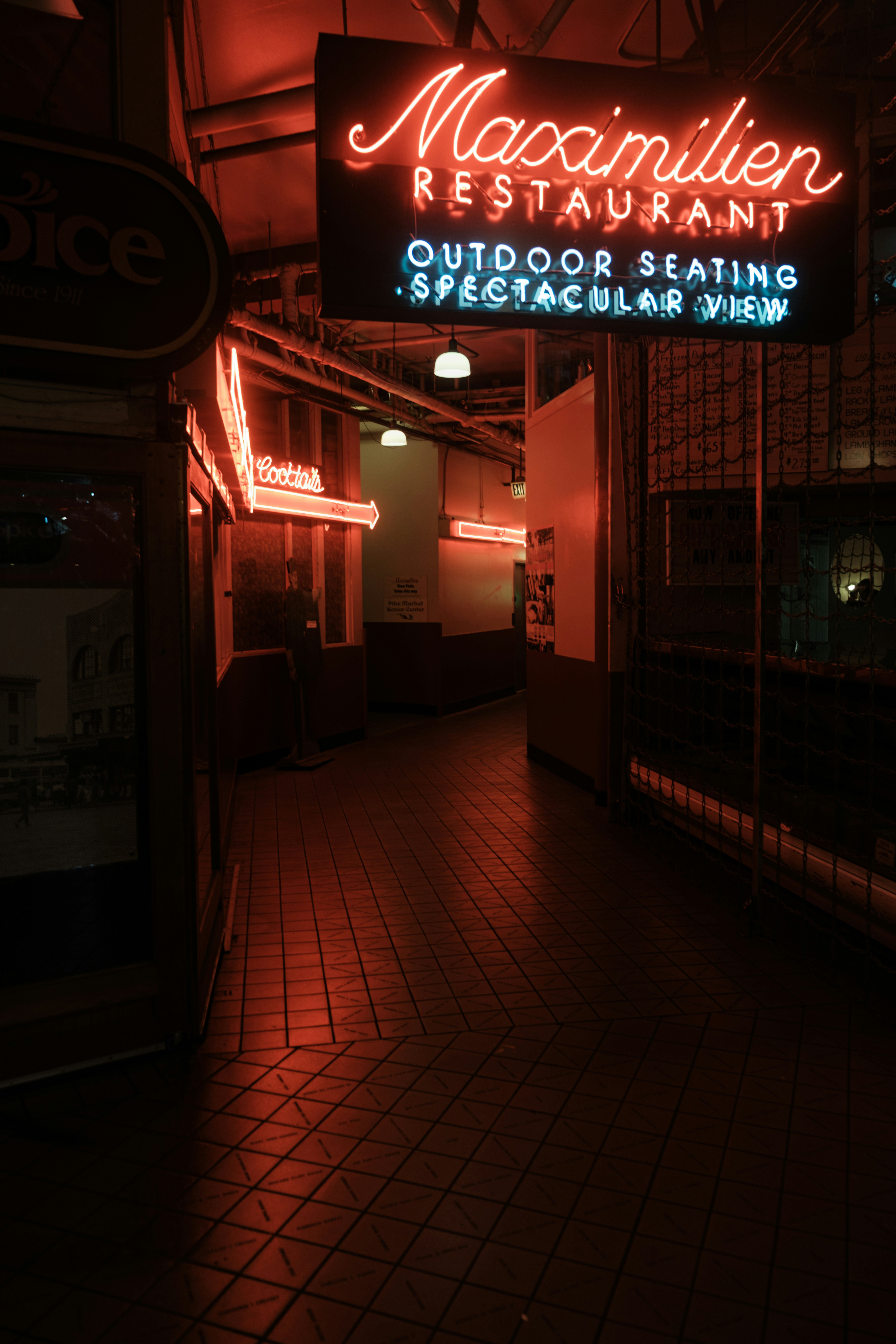 Neon Alleyway to the Maximilien Sign