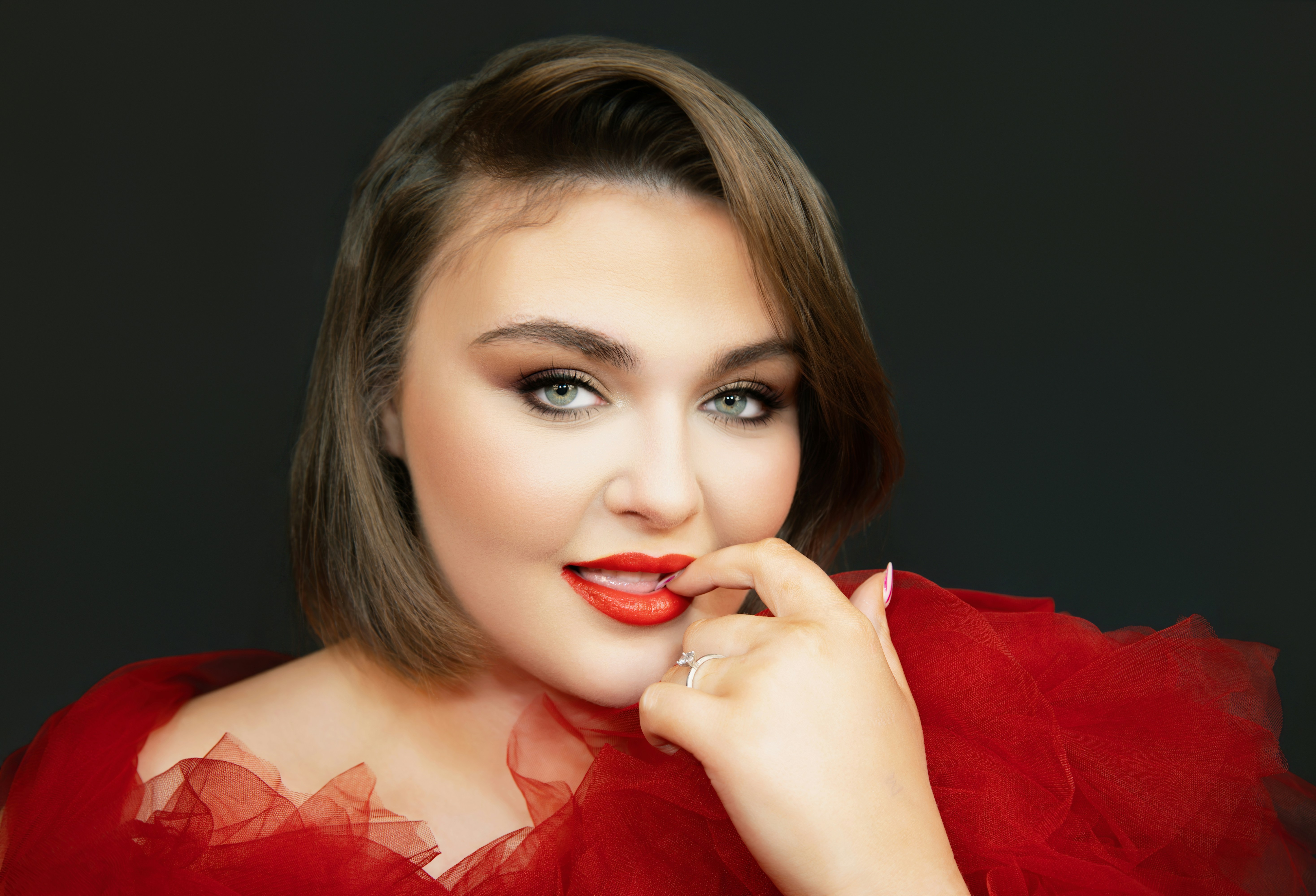 Red Silence: A Velvet Moment in Portrait