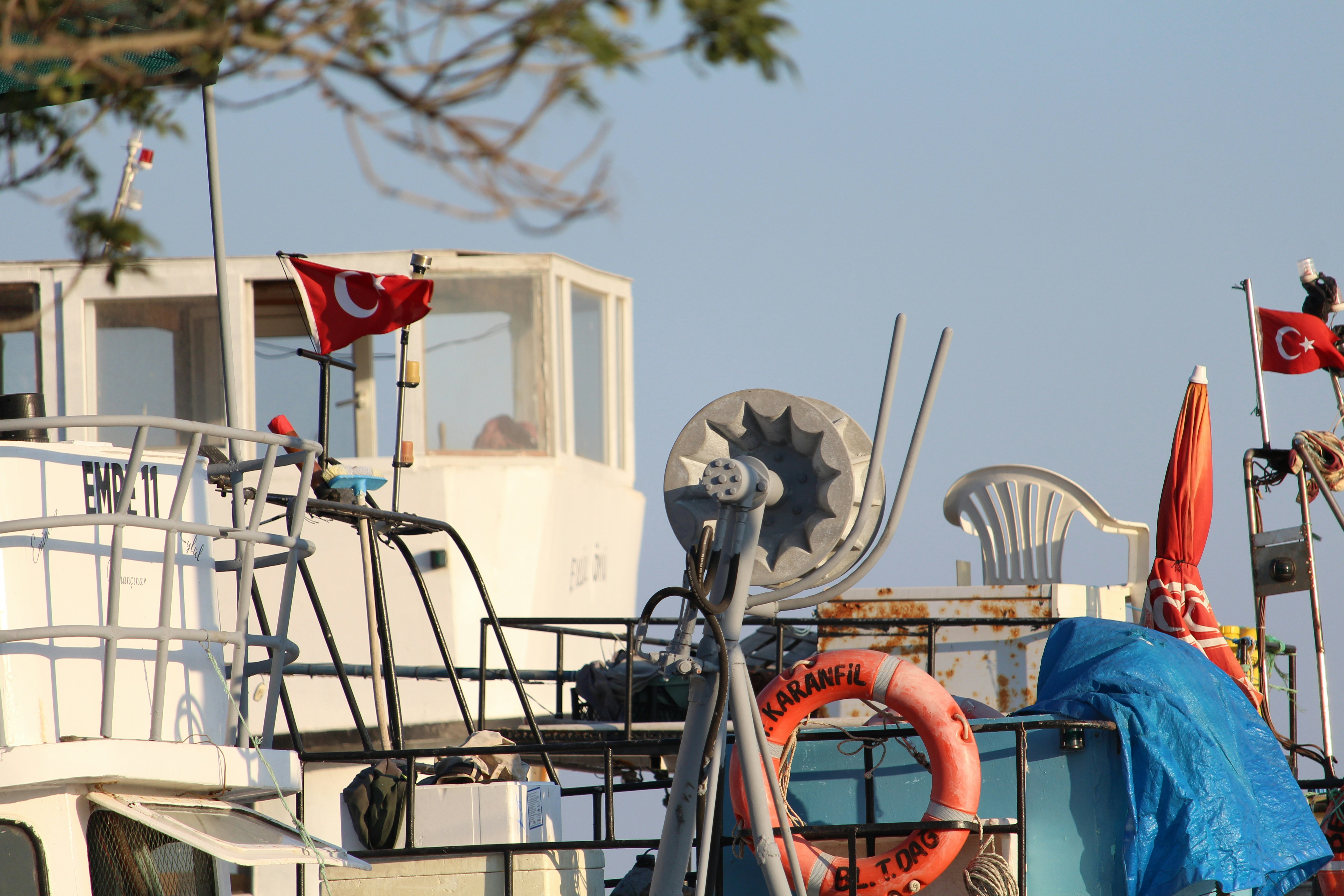 Flags and Lifesaving Gear on a Docked Vessel