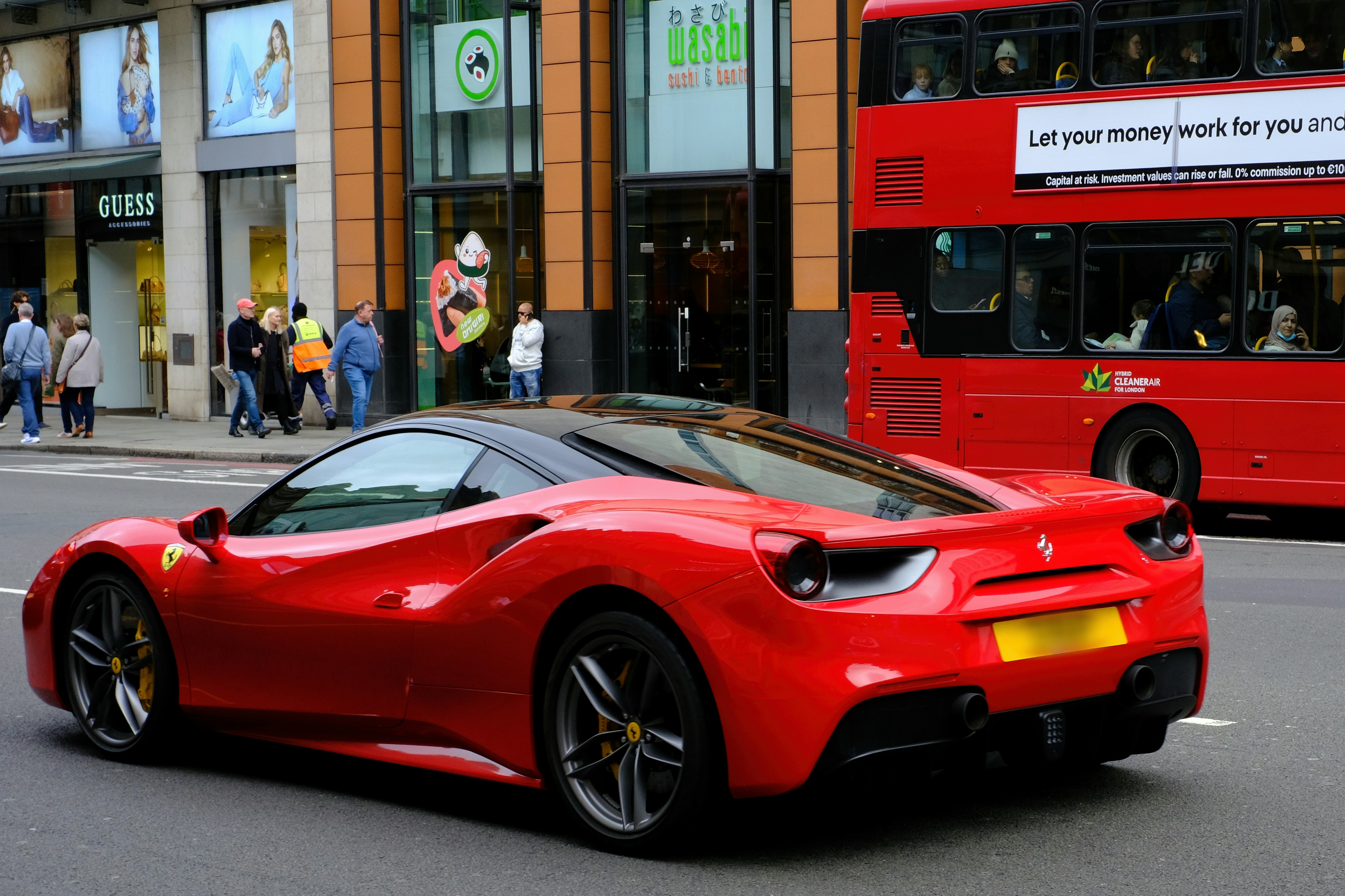 Scarlet Curves: A Ferrari Shapes London’s Street Scene