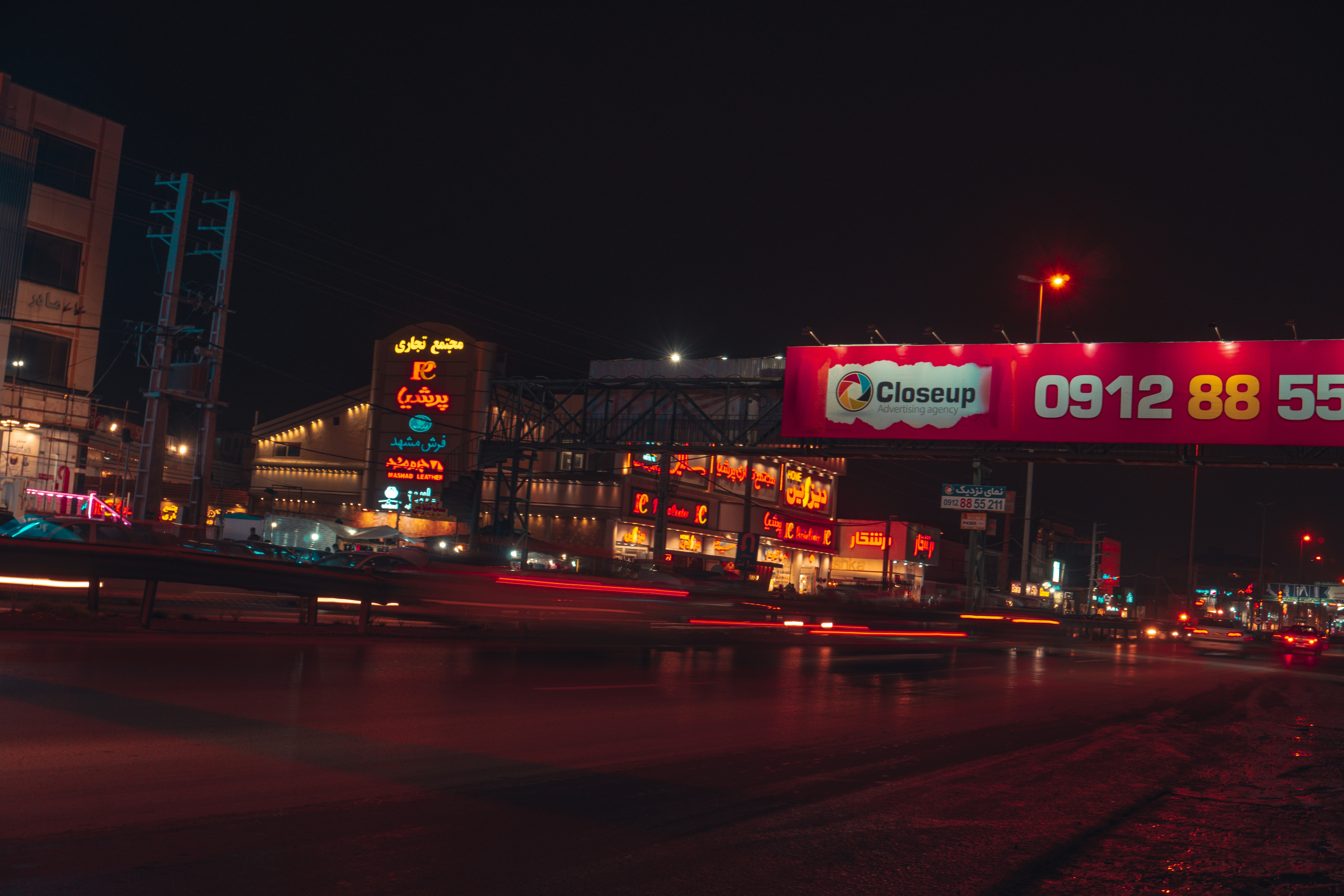 Neon Lifelines Over a Quiet Boulevard
