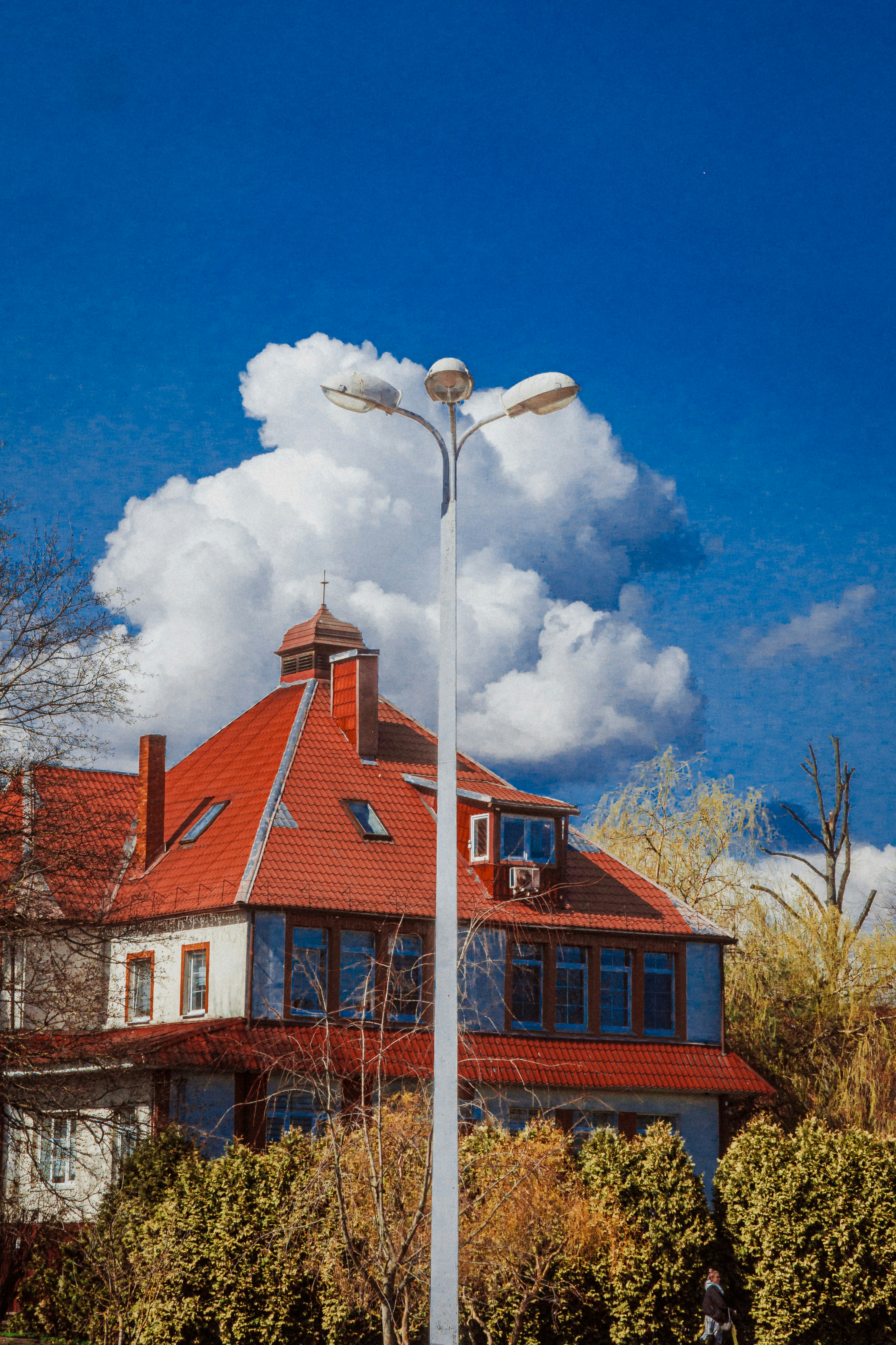 Red Roofs and Skyward Illumination