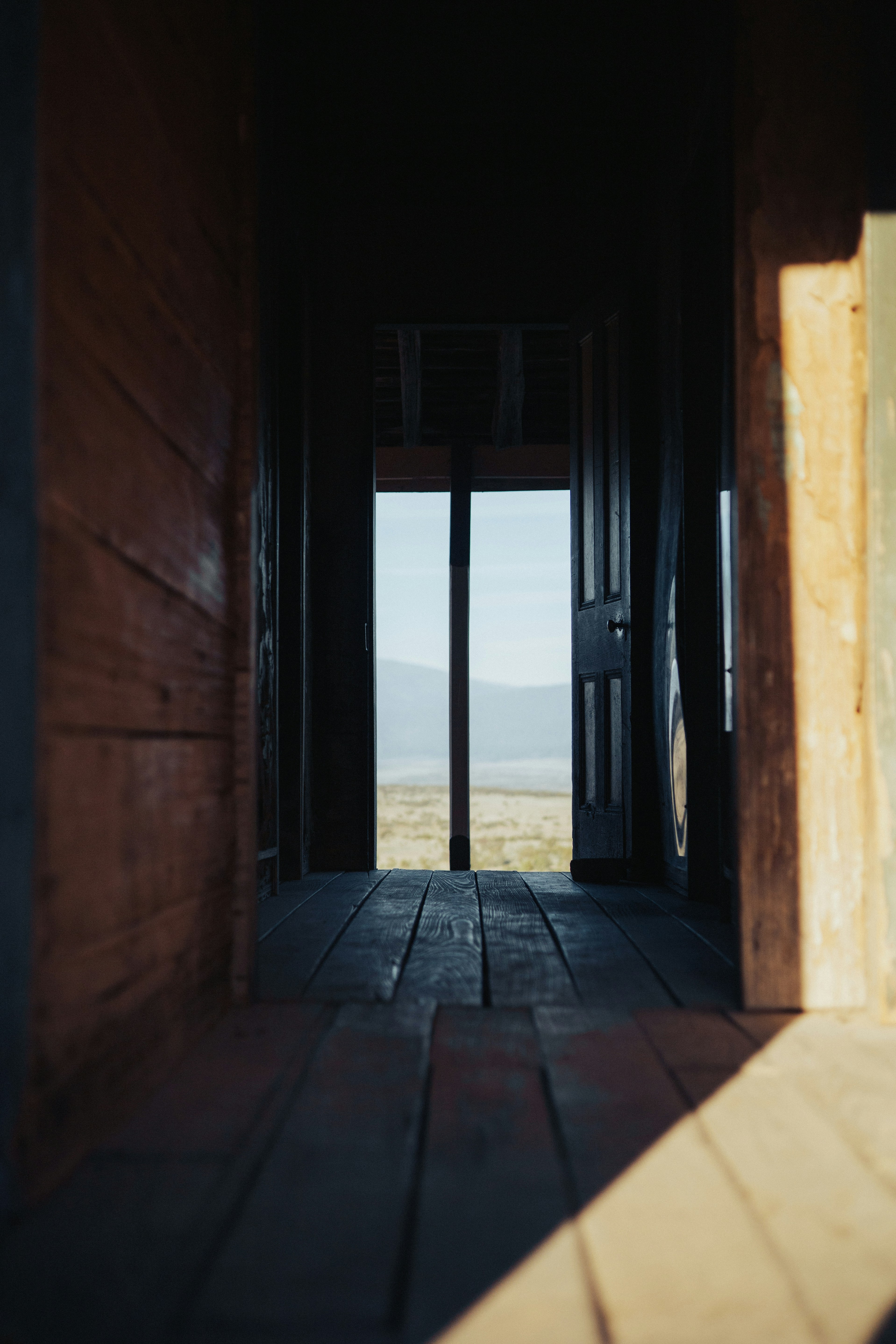 Doorway to the Desert: A Narrow Corridor Framing the Open Landscape