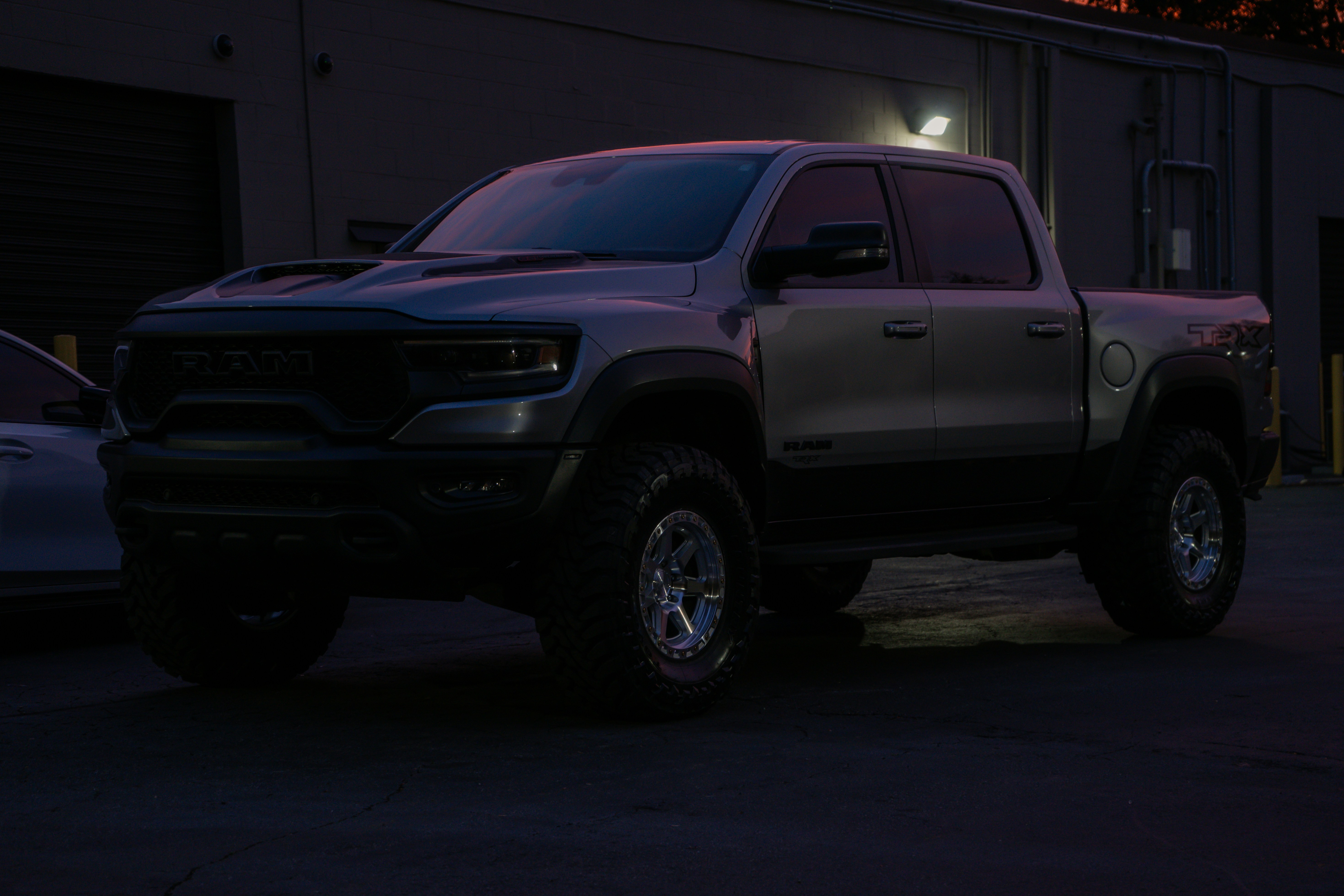 Shadowed Power: A Dark-Toned Pickup Waiting for Dawn