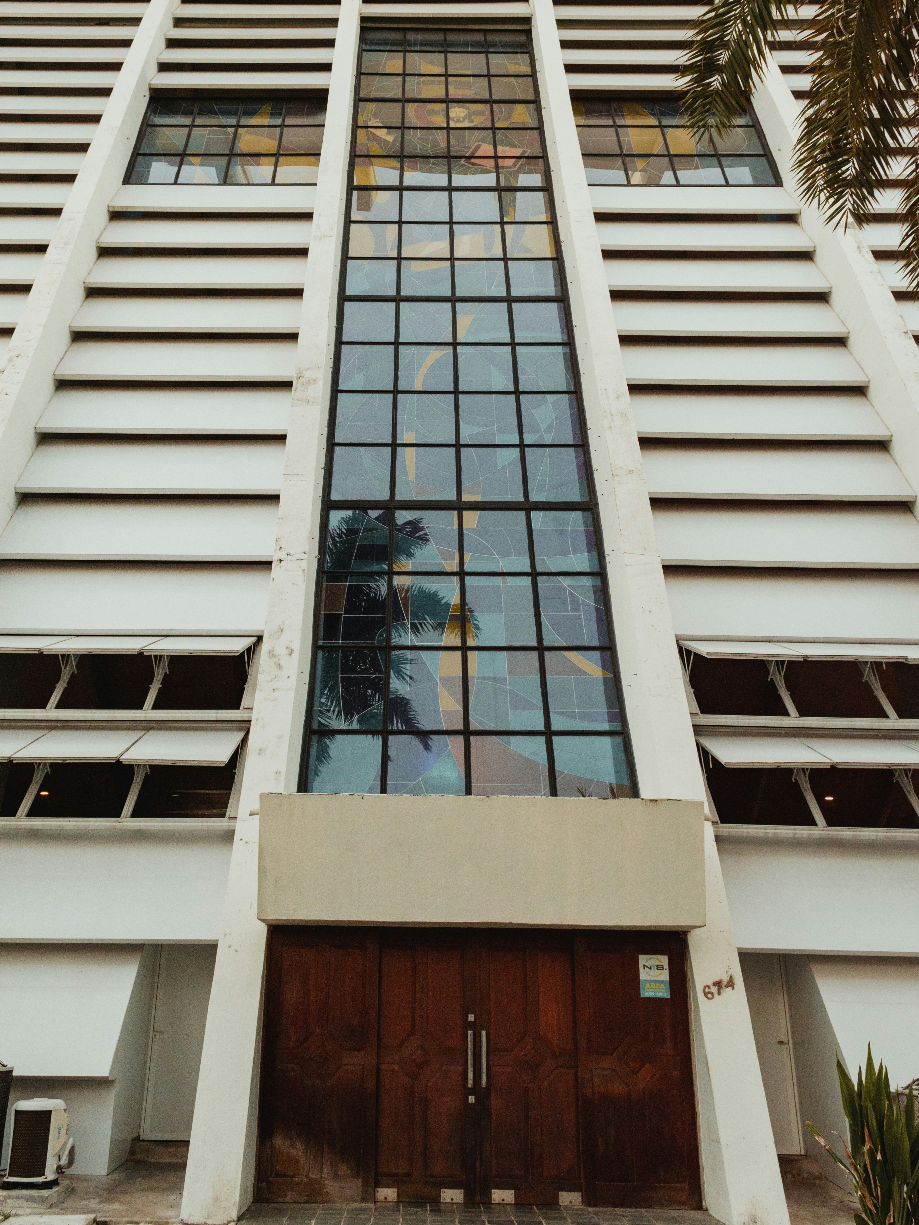 Vertical Glass Canvas: A Central Facade Stretch