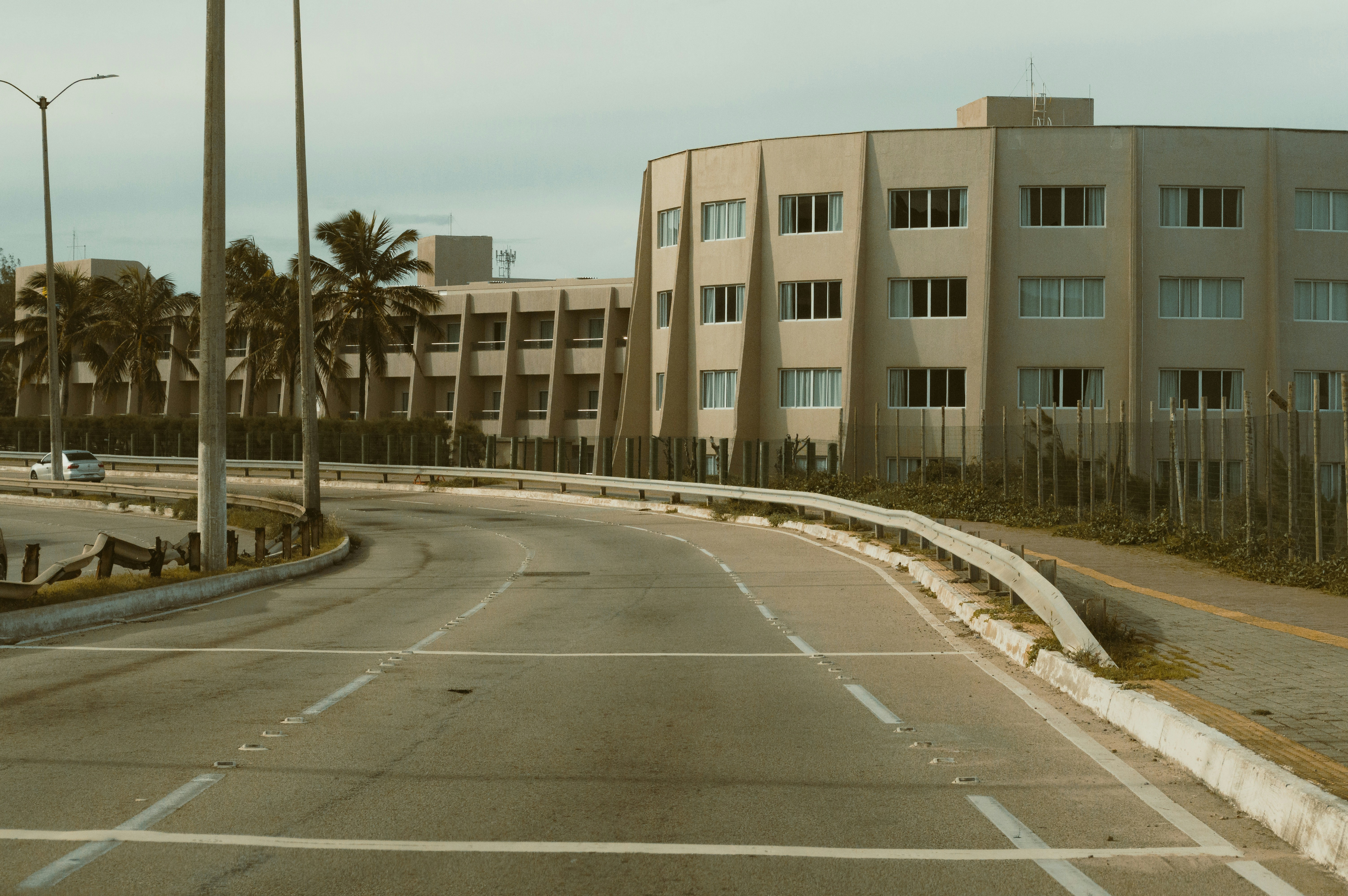Deserted Coastal Boulevard toward a Modern Campus