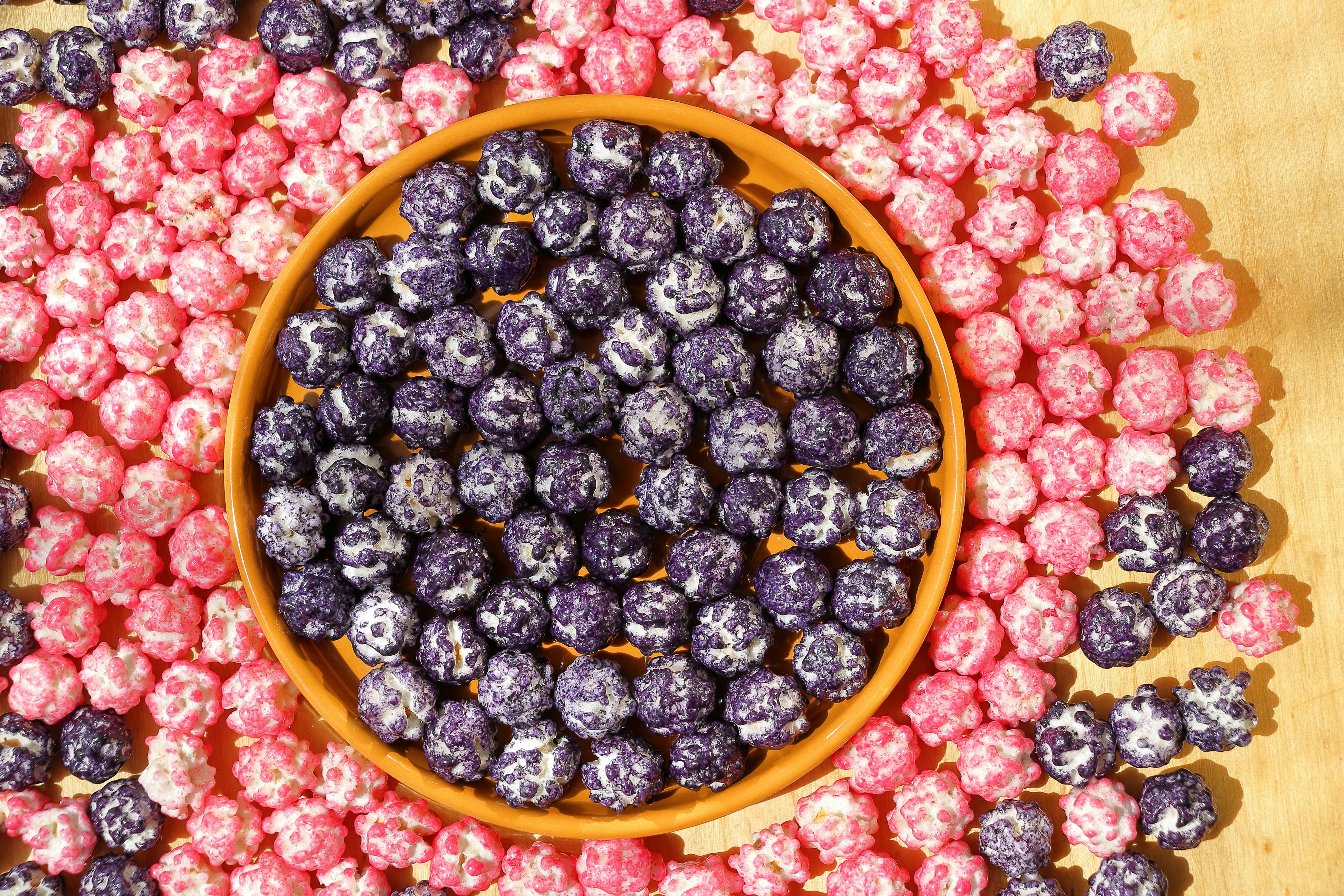 Berry Mosaic: Central Bowl Framed by a Field of Frozen Pink and Indigo Berries