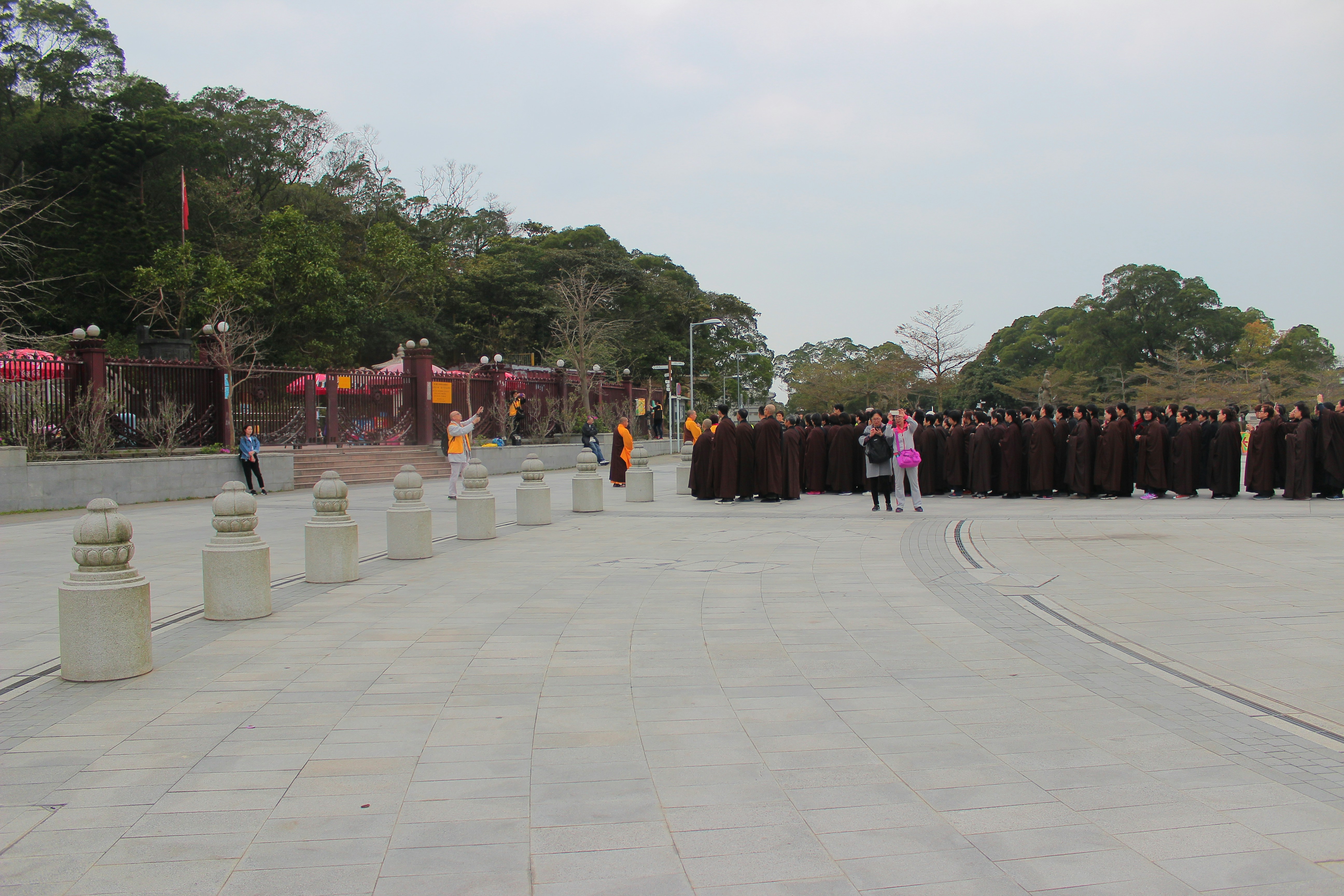 A Quiet Line of Monastic Robes at a Temple Courtyard