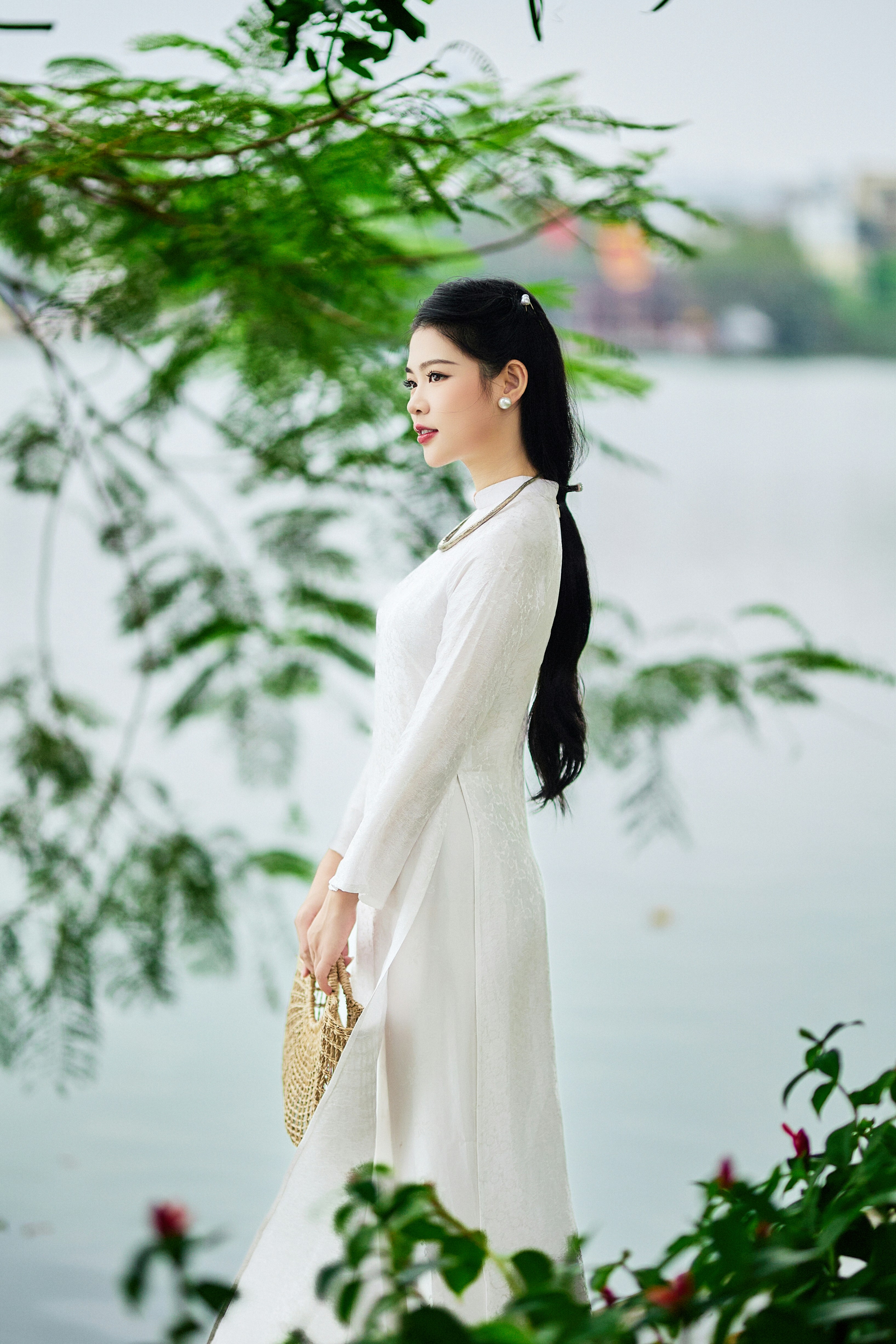Grace by the Lakeside: A Portrait in White