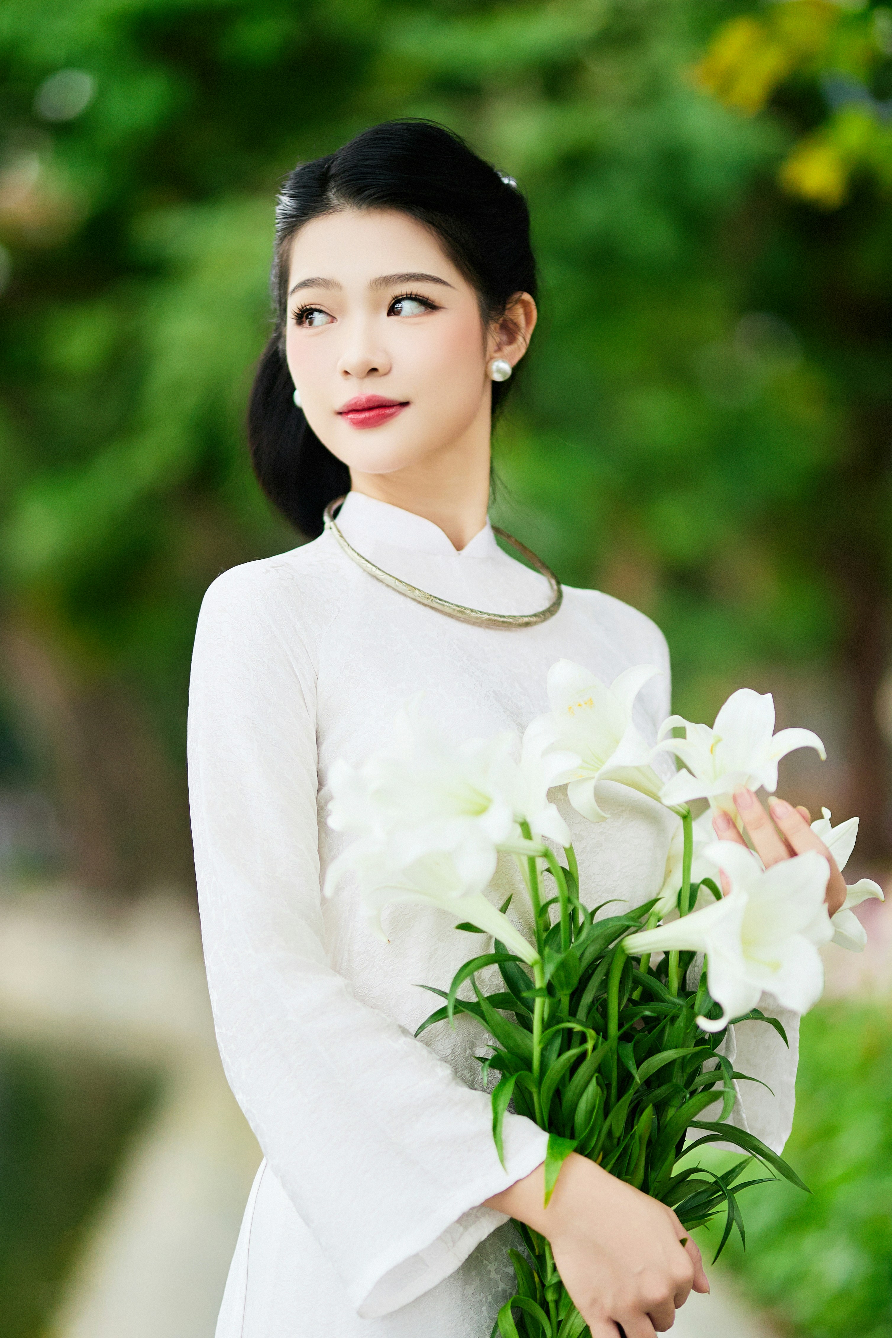 Bride in White: Elegance Amid White Lilies