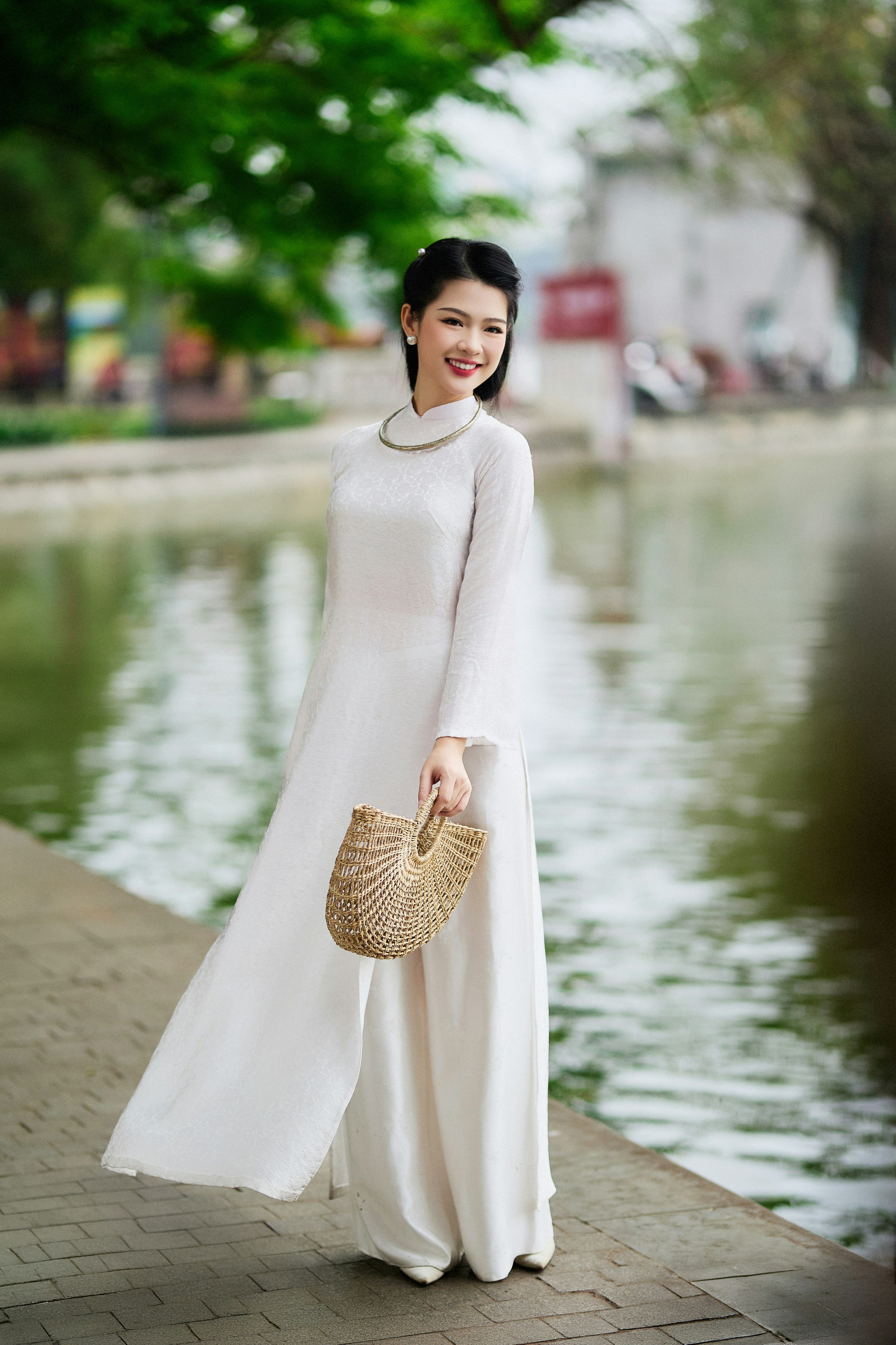 Desaturated Grace by the Pond: A Portrait in White