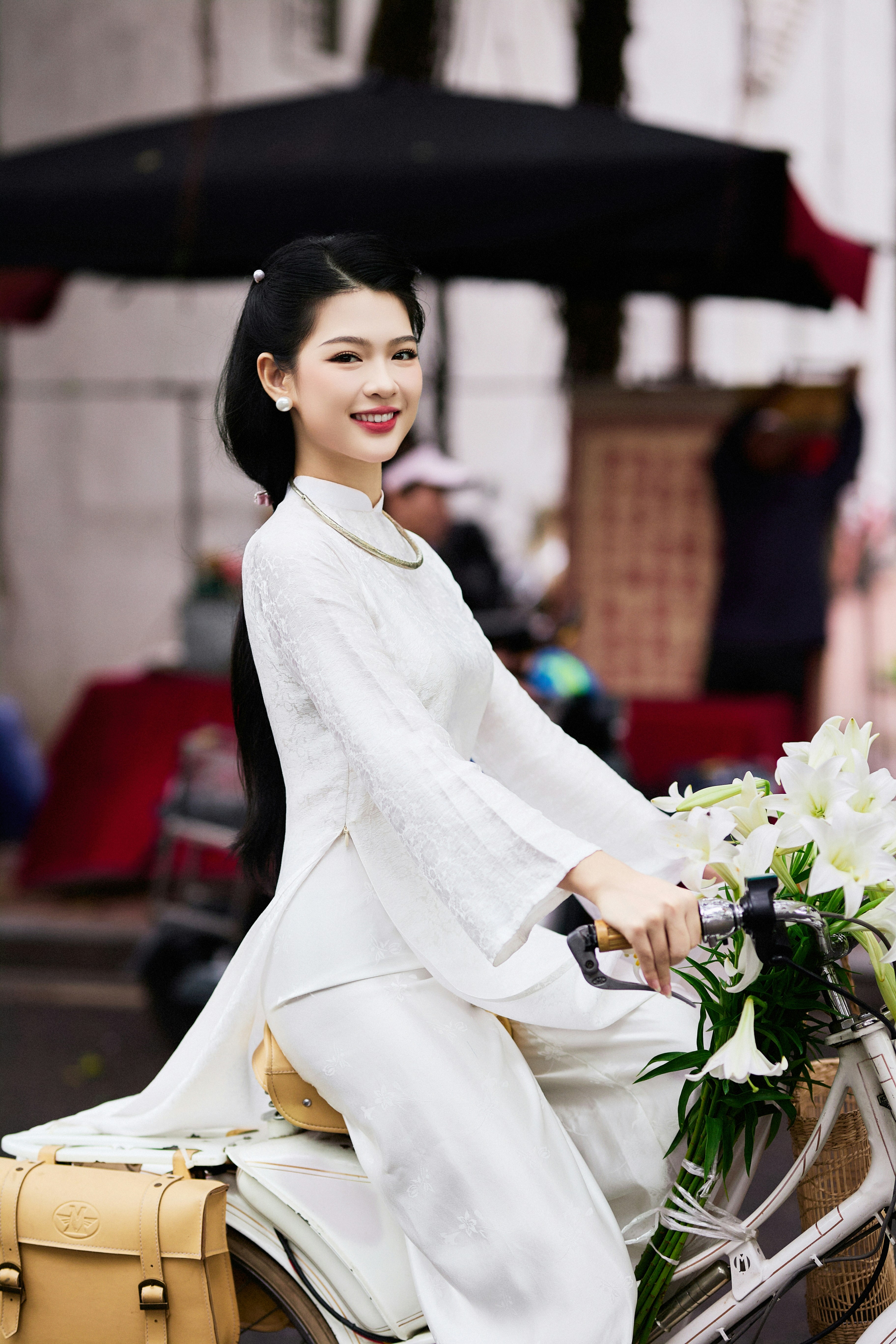 Graceful Ride: A Portrait on a White-Cerulean Bicycle of Blooming Lily Directions