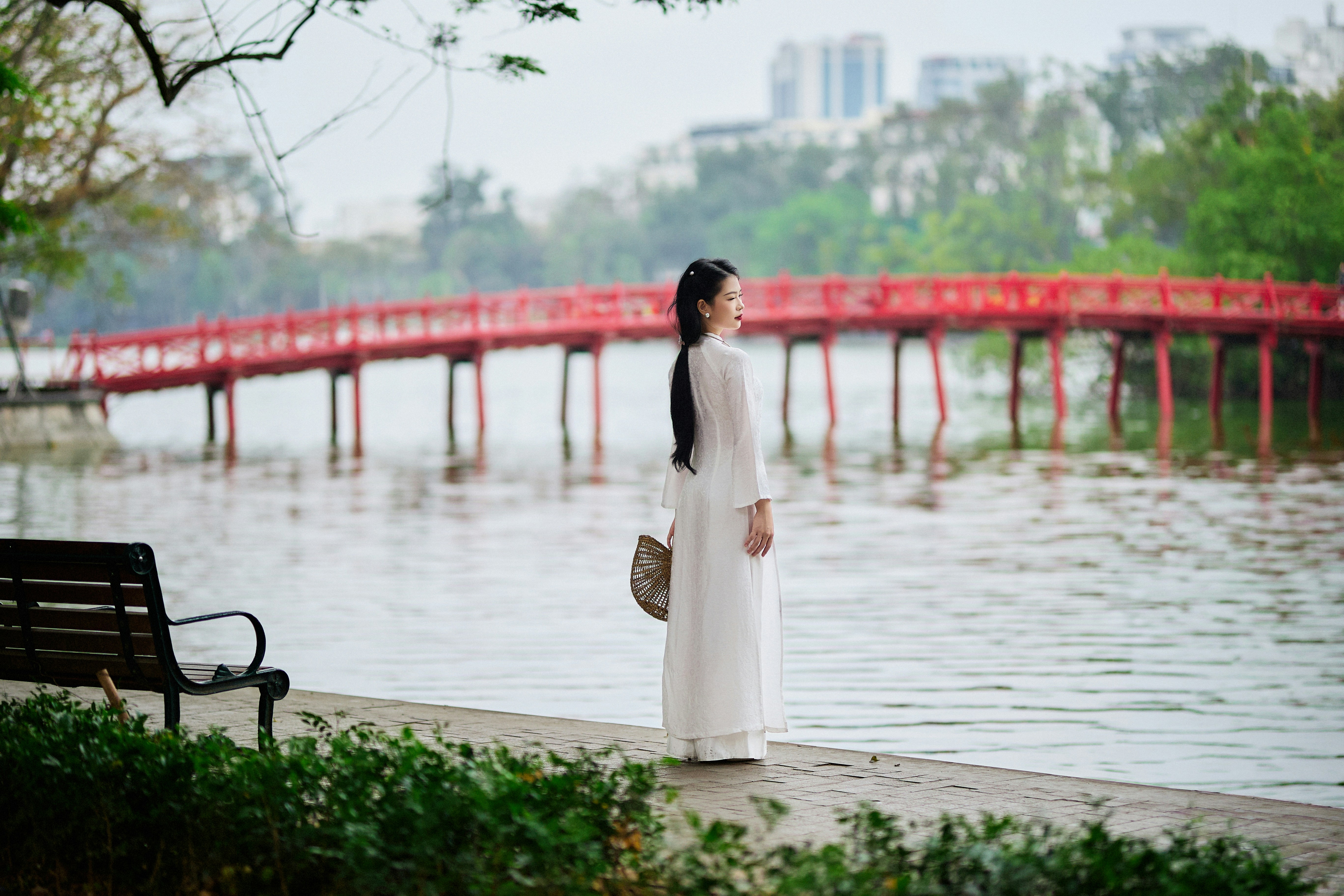 Elegance by the Red Pier: A Quiet Moment by the Water