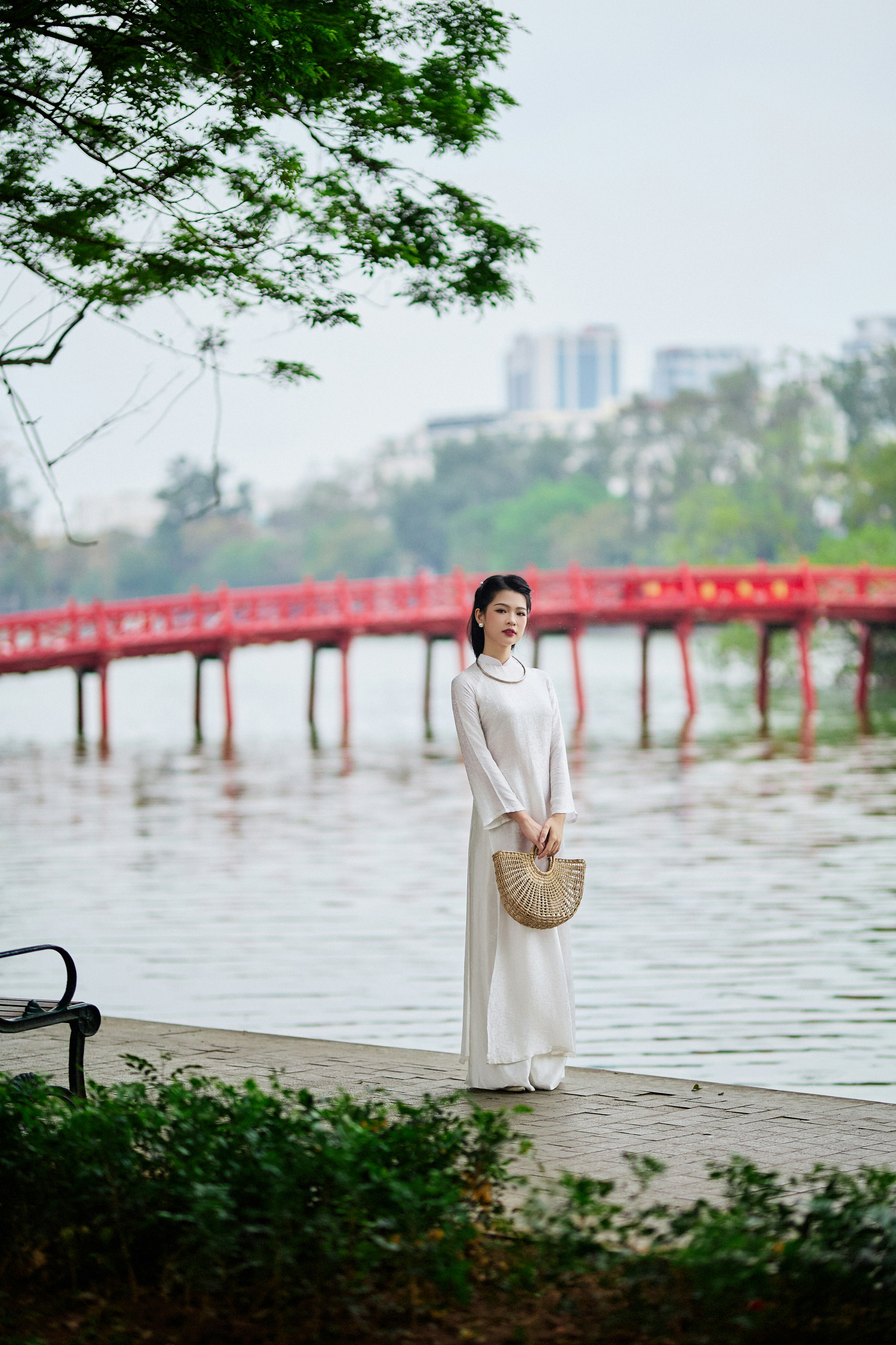 Grace by the Riverside: A Quiet Poise in White