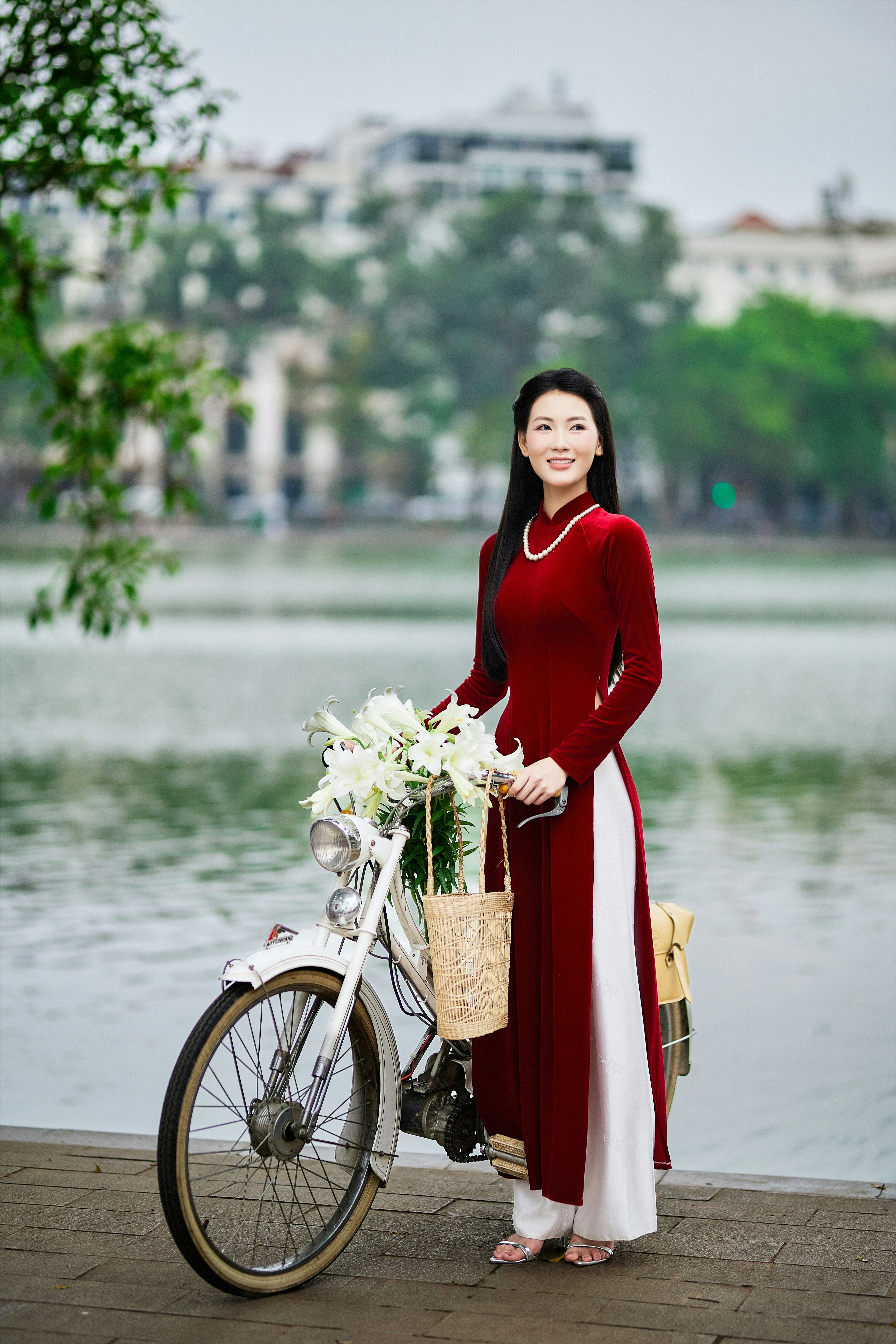 Red Velvet by the Lake: A Quiet Portrait with a Flowered Bicycle