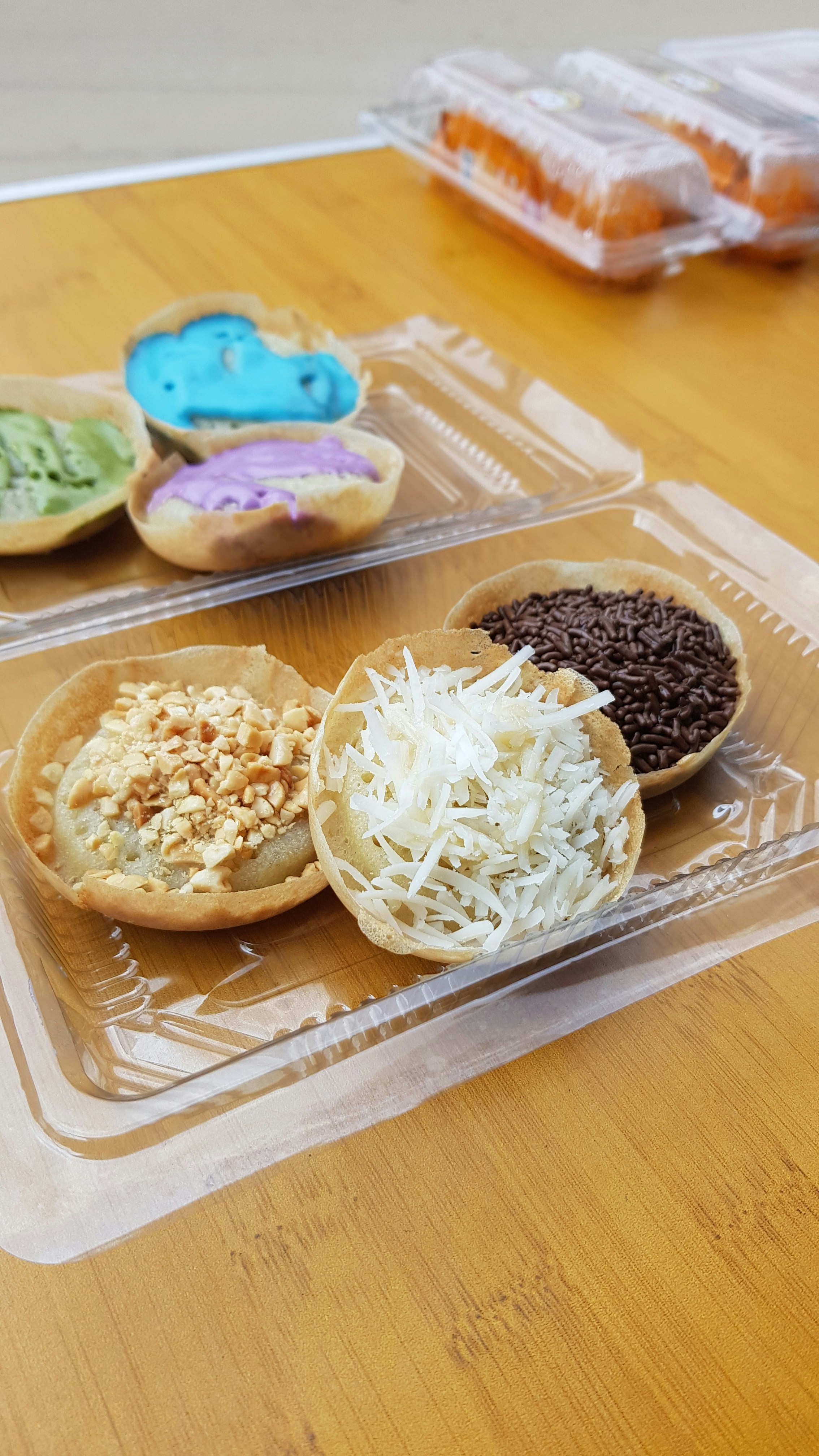 Assorted Tarts on a Clear Plastic Tray