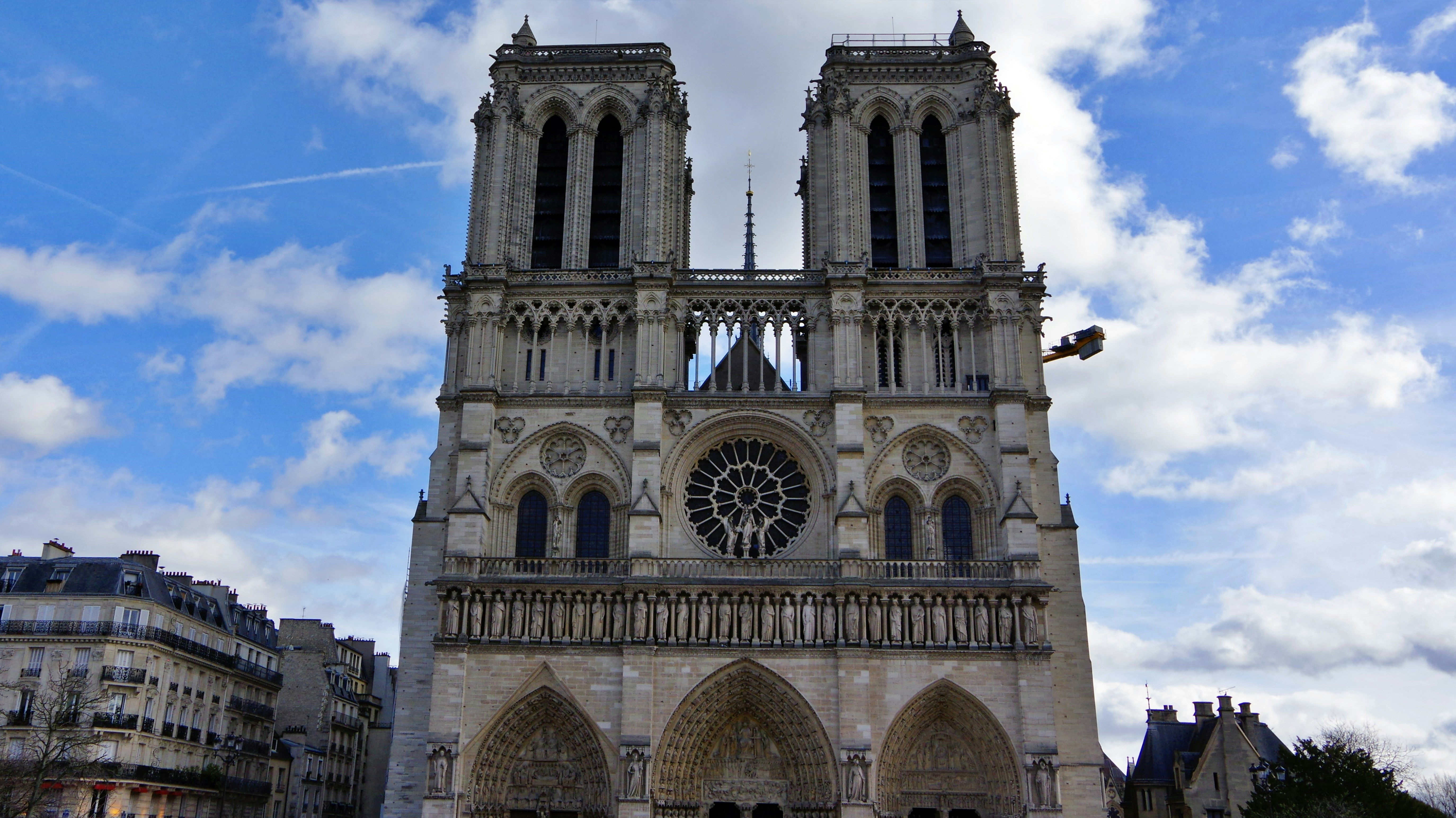 Notre-Dame Facade Under a Bright Parisian Sky