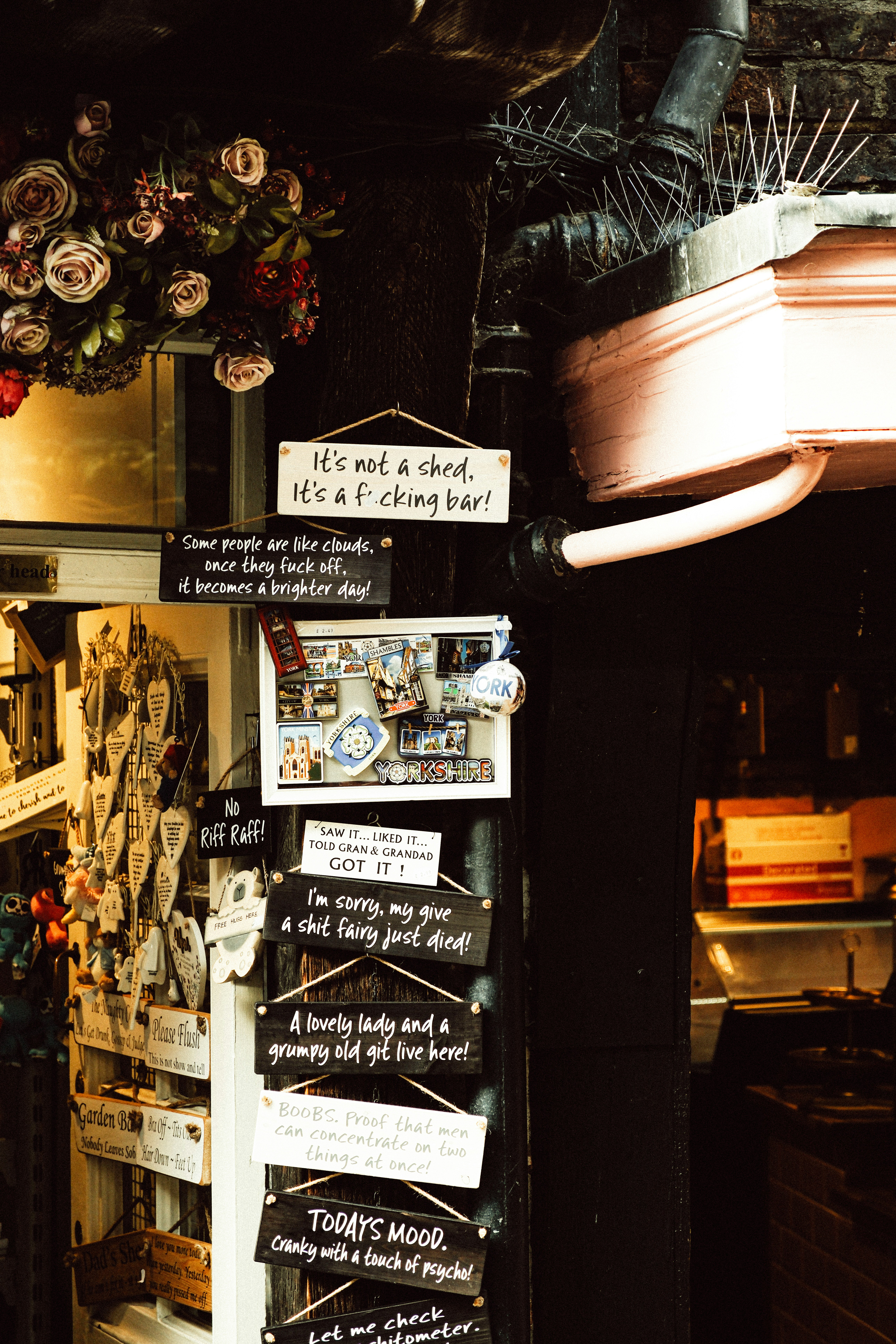 Whimsical Wall of Words: Notes, Nods, and Neon in a Night Market Nook