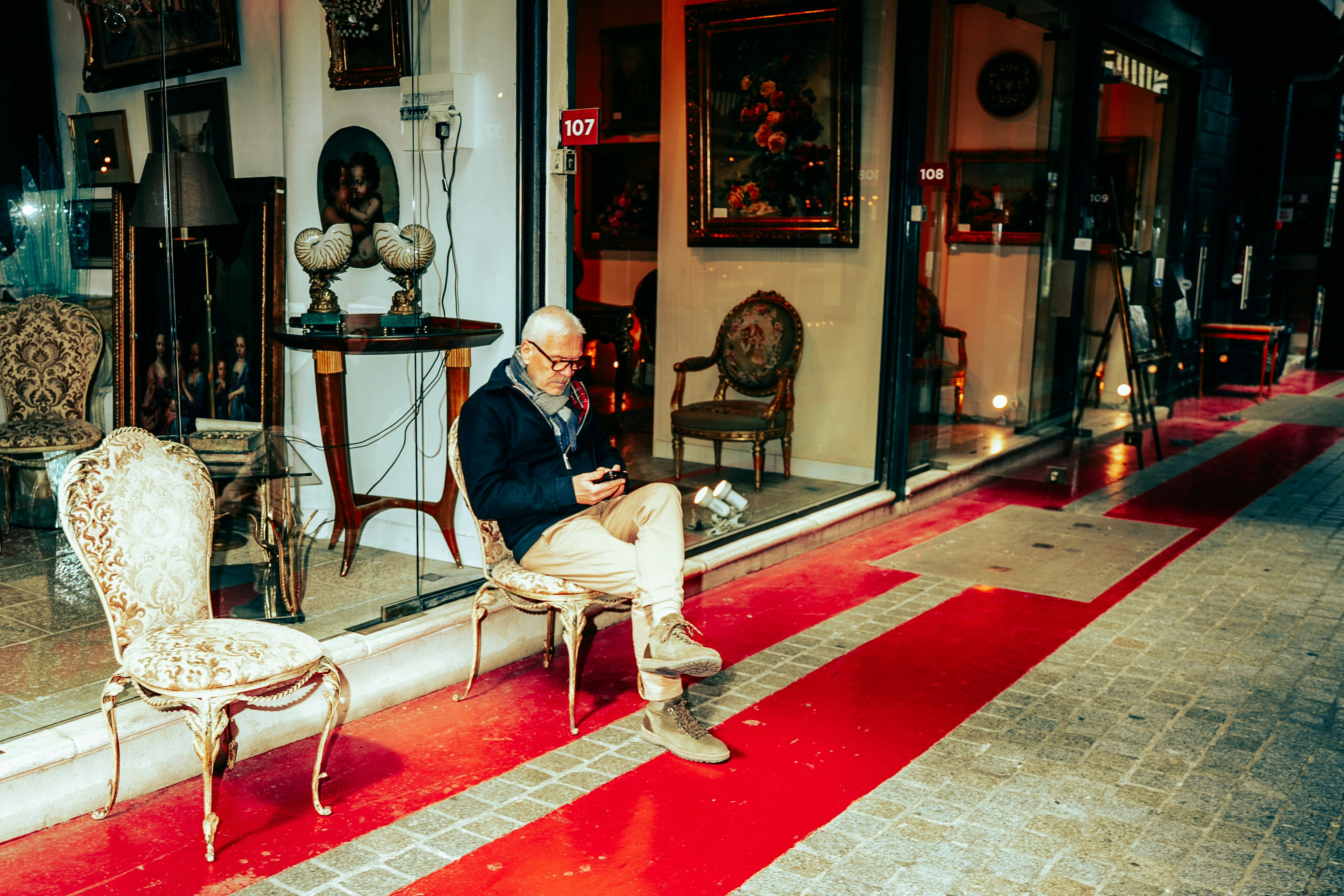 Quiet Portrait on a Red Carpet Path