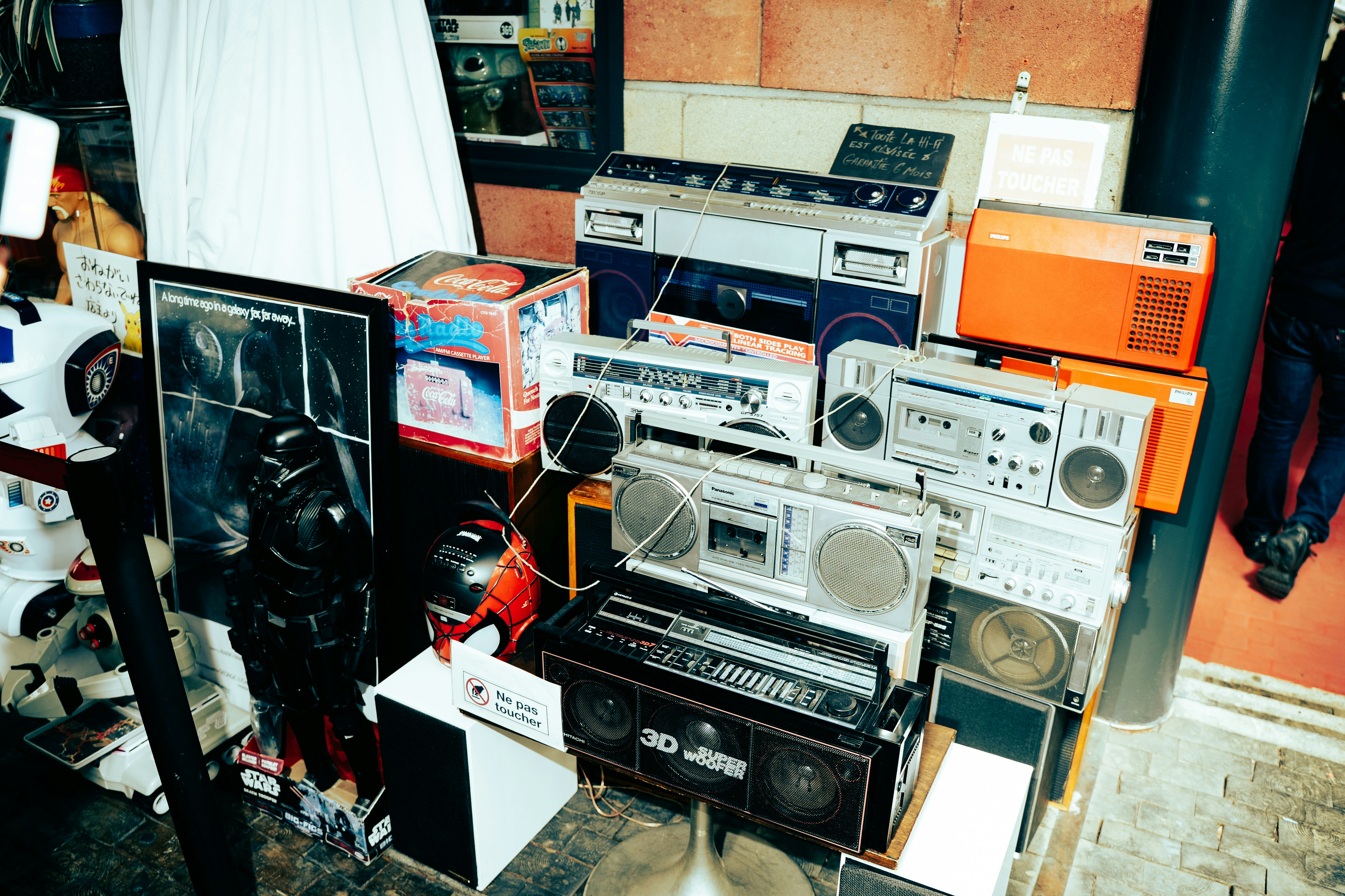 Vintage Stack of Boomboxes in a Corner Shop