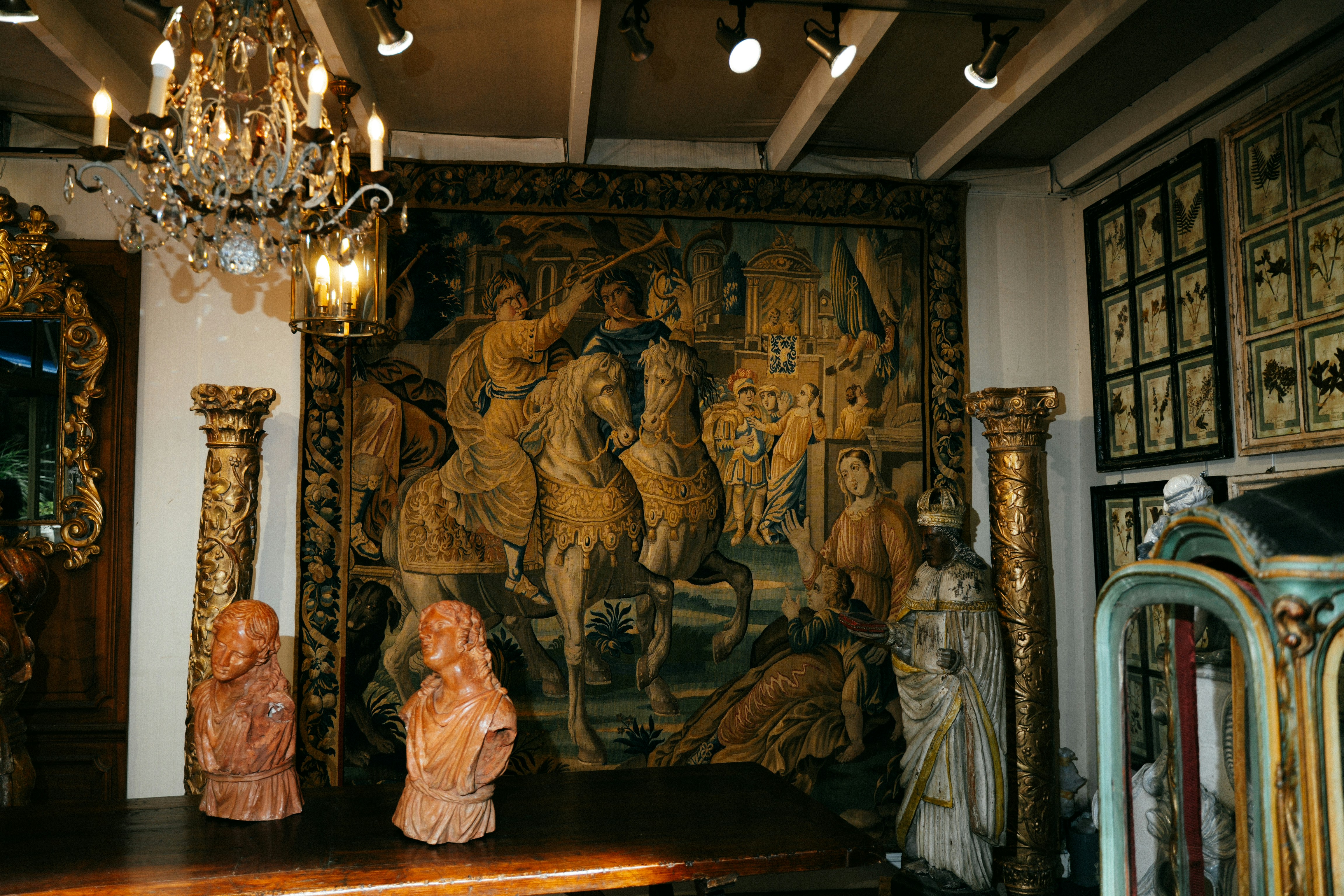 Ornate Scene: A Warm Gallery of Tapestry and Statues