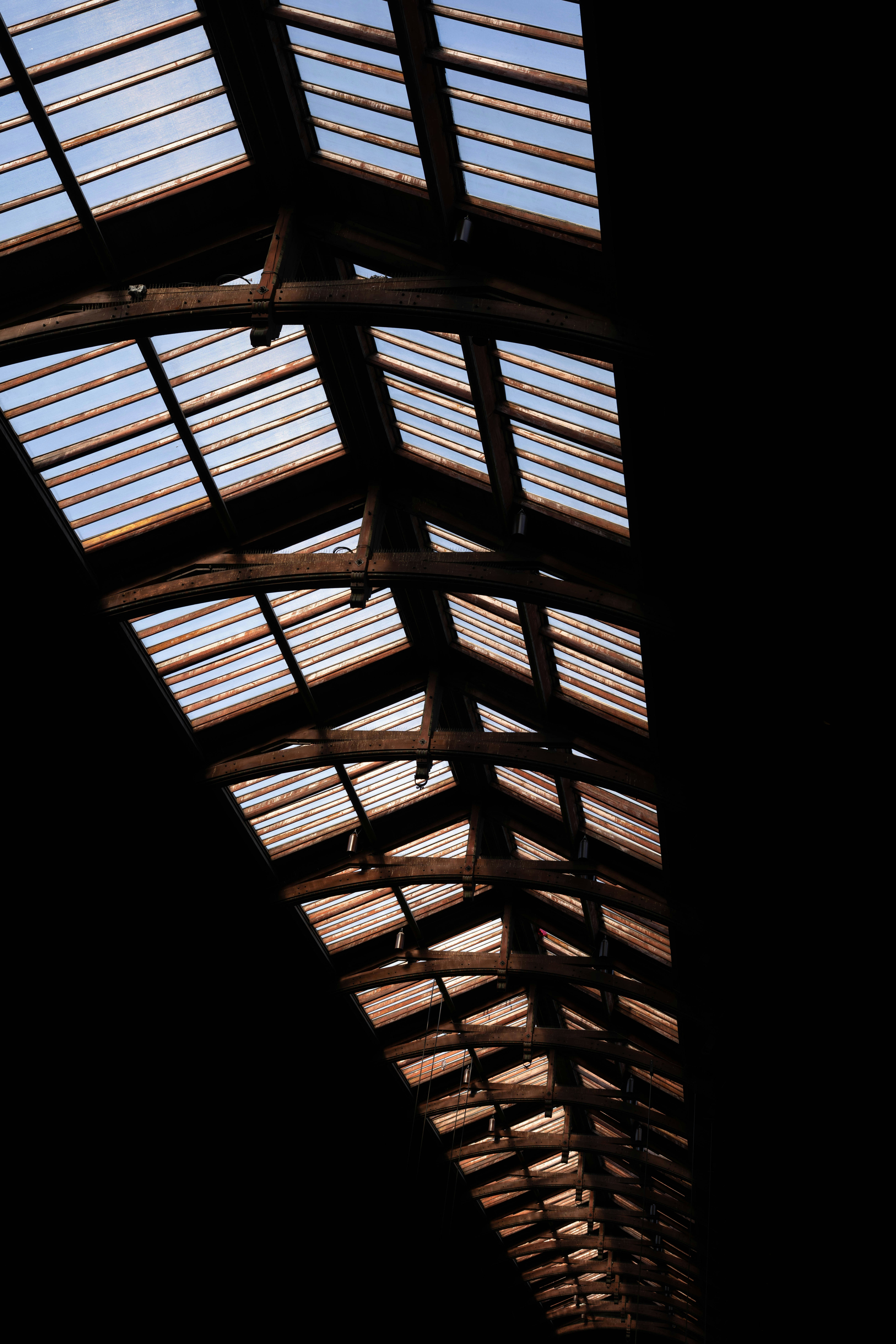 Geometric Cathedral: Dormers of Light in a Dark Interior