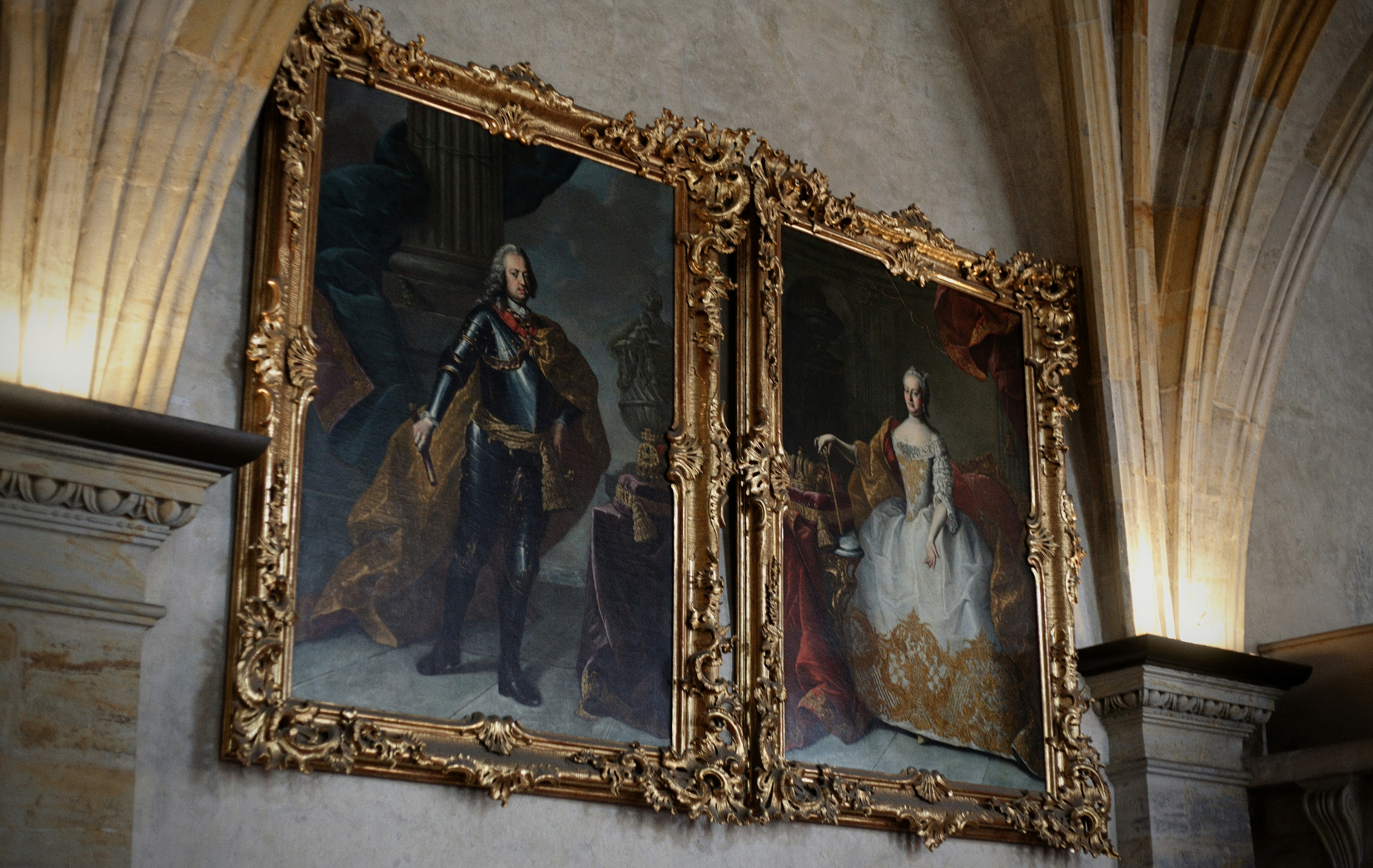Ornate Portrait Pair Adorning a Cathedral Wall
