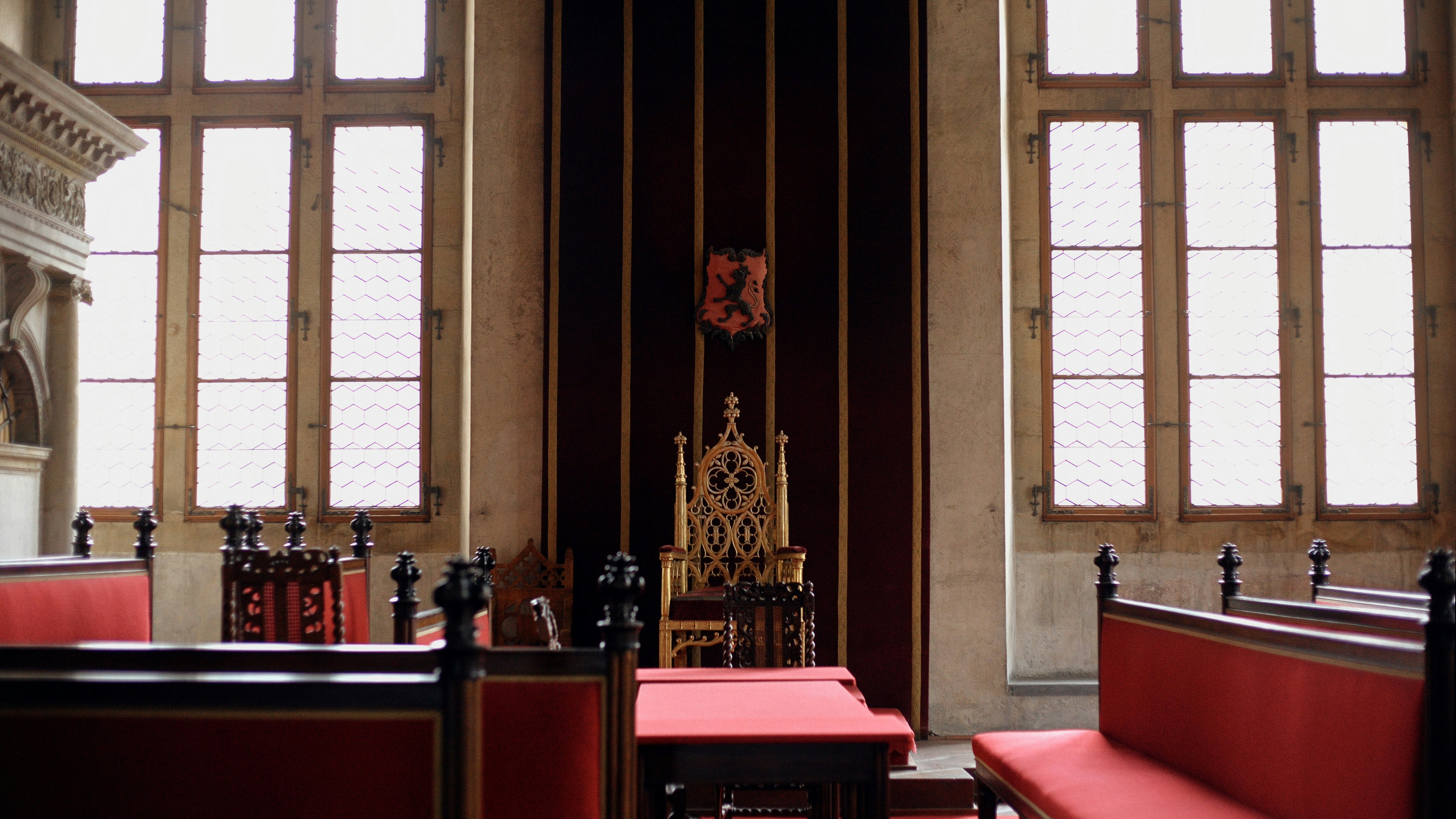 Silent Chapel: Morning Light on Velvet Benches