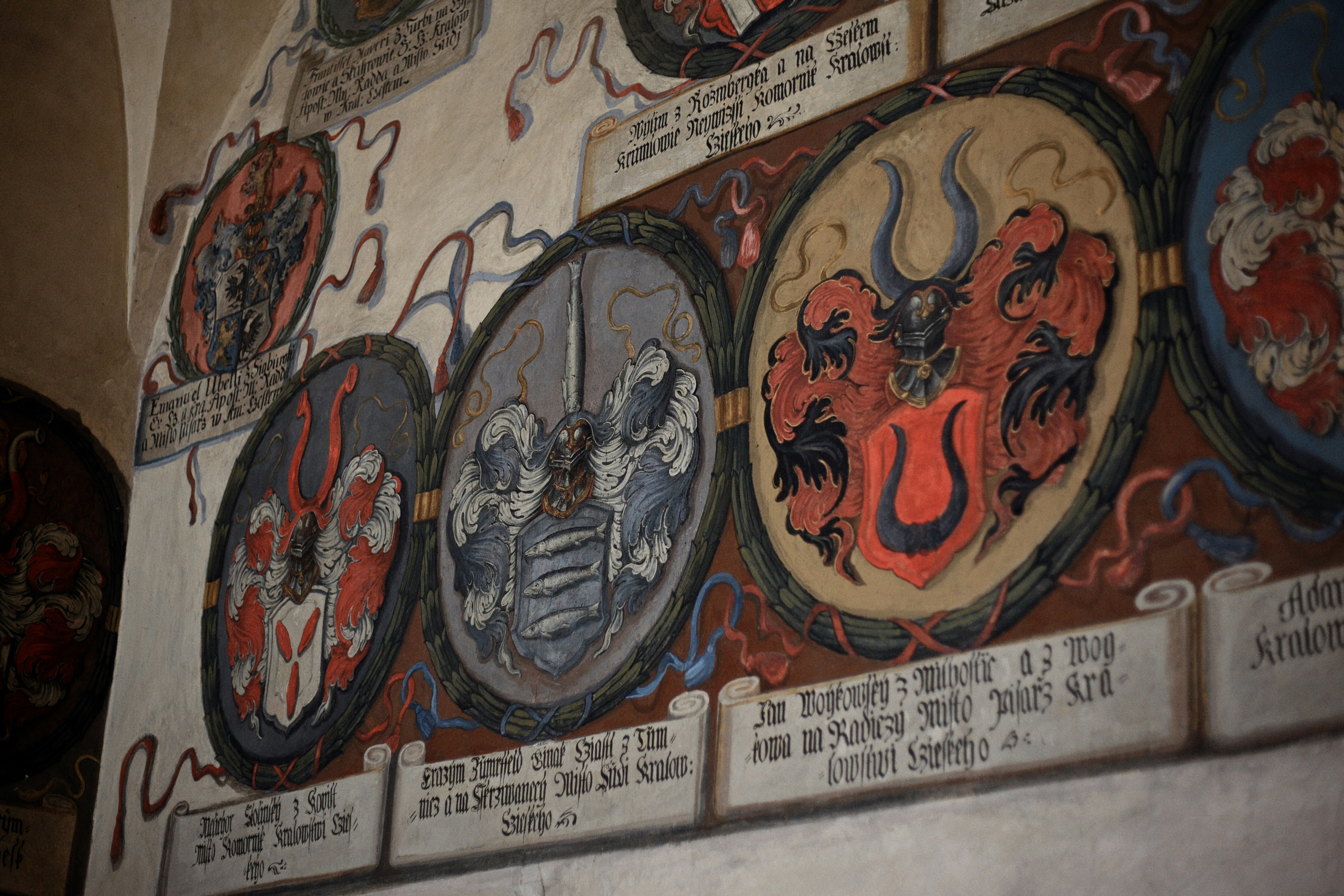 Heraldic Medallions on a Historic Wall