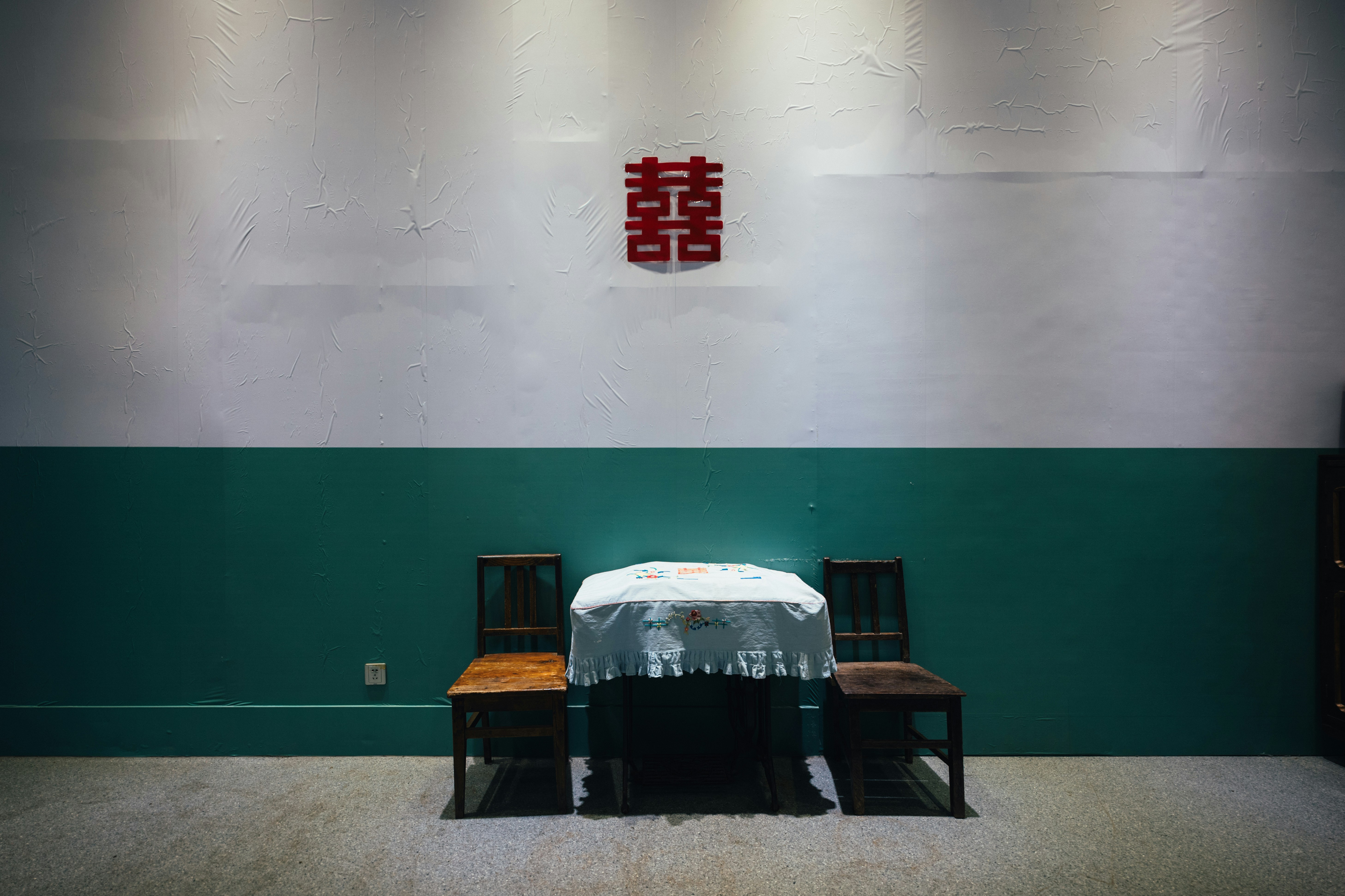 Table for Three: An Intimate Corner in a Quiet Hall