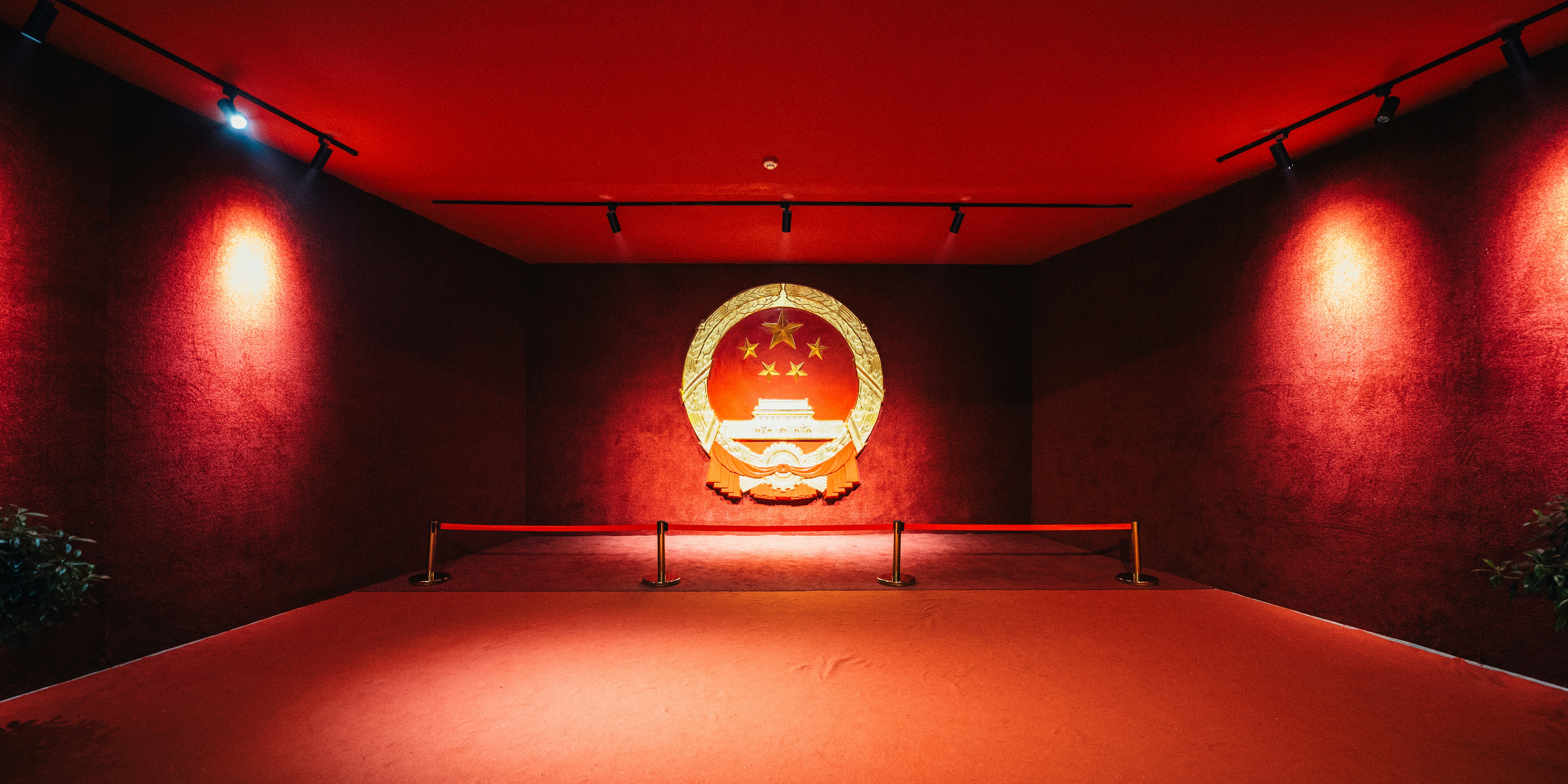 Red Balcony of Authority: A Silent Hall with Emblematic Glow