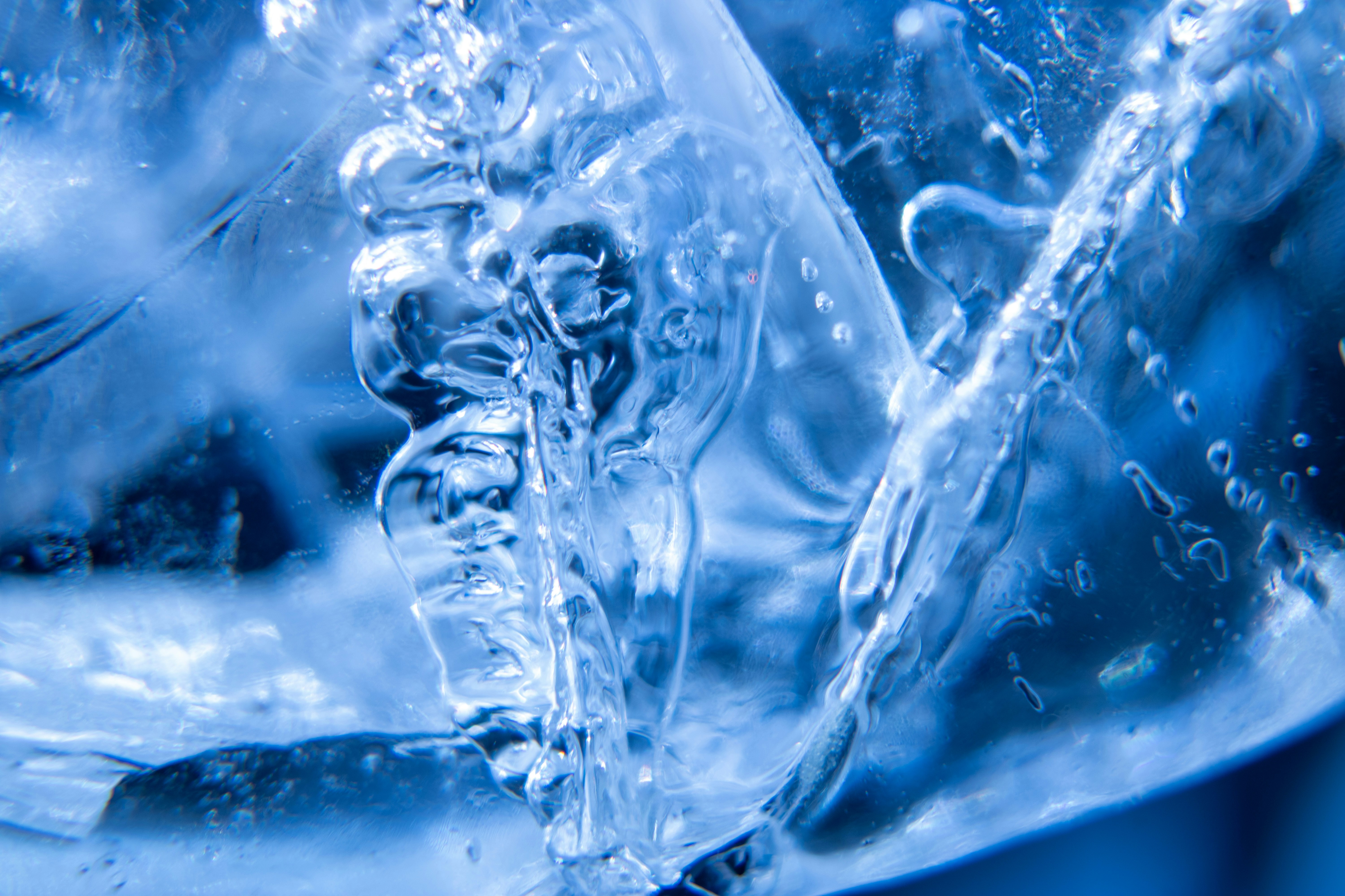 Prismatic Freeze: Close-Up of Ice Formation in Cool Blues