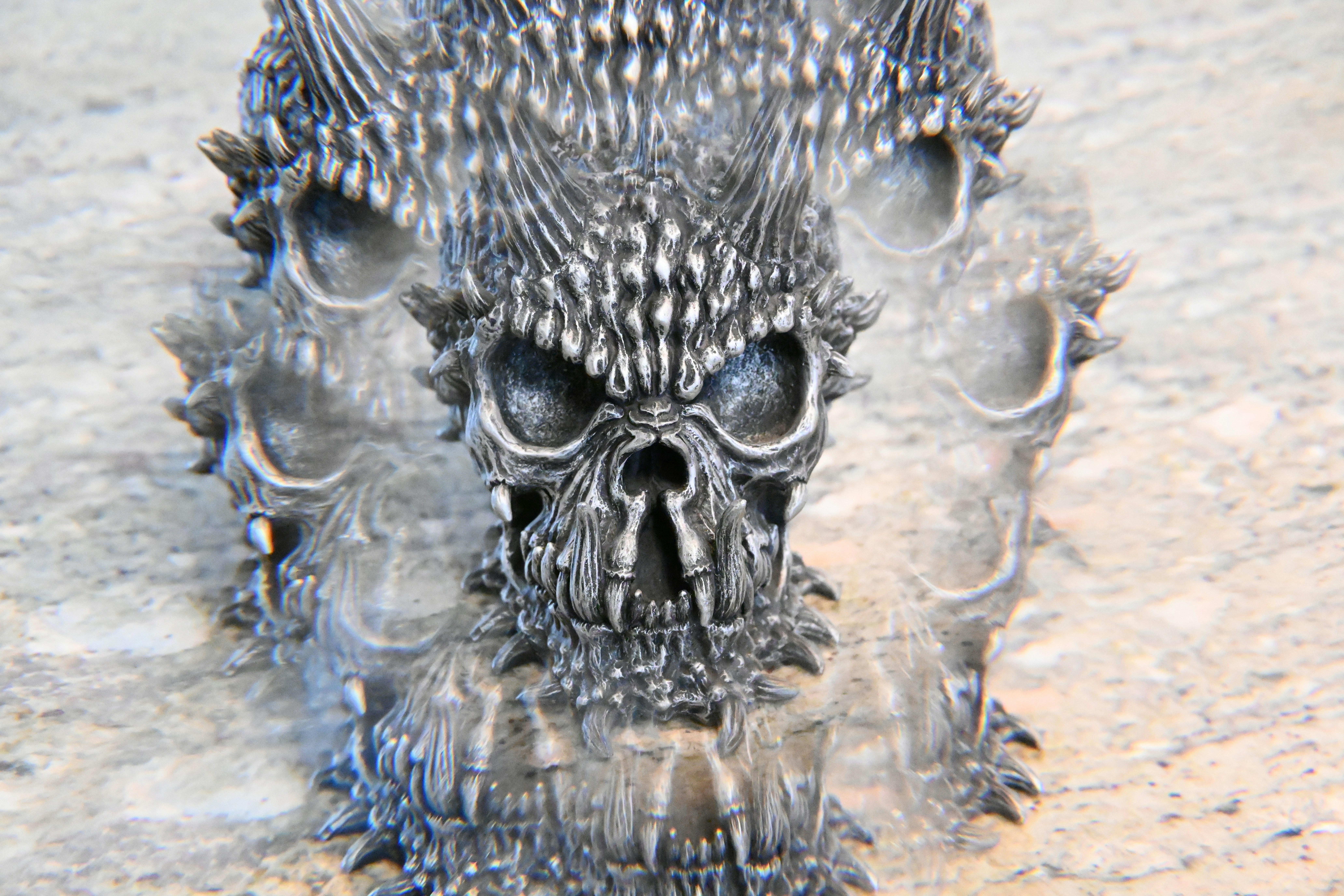 Ghostly Visage Risen from Stone: A Closer Look at the Carved Skull-Twin Sculpture
