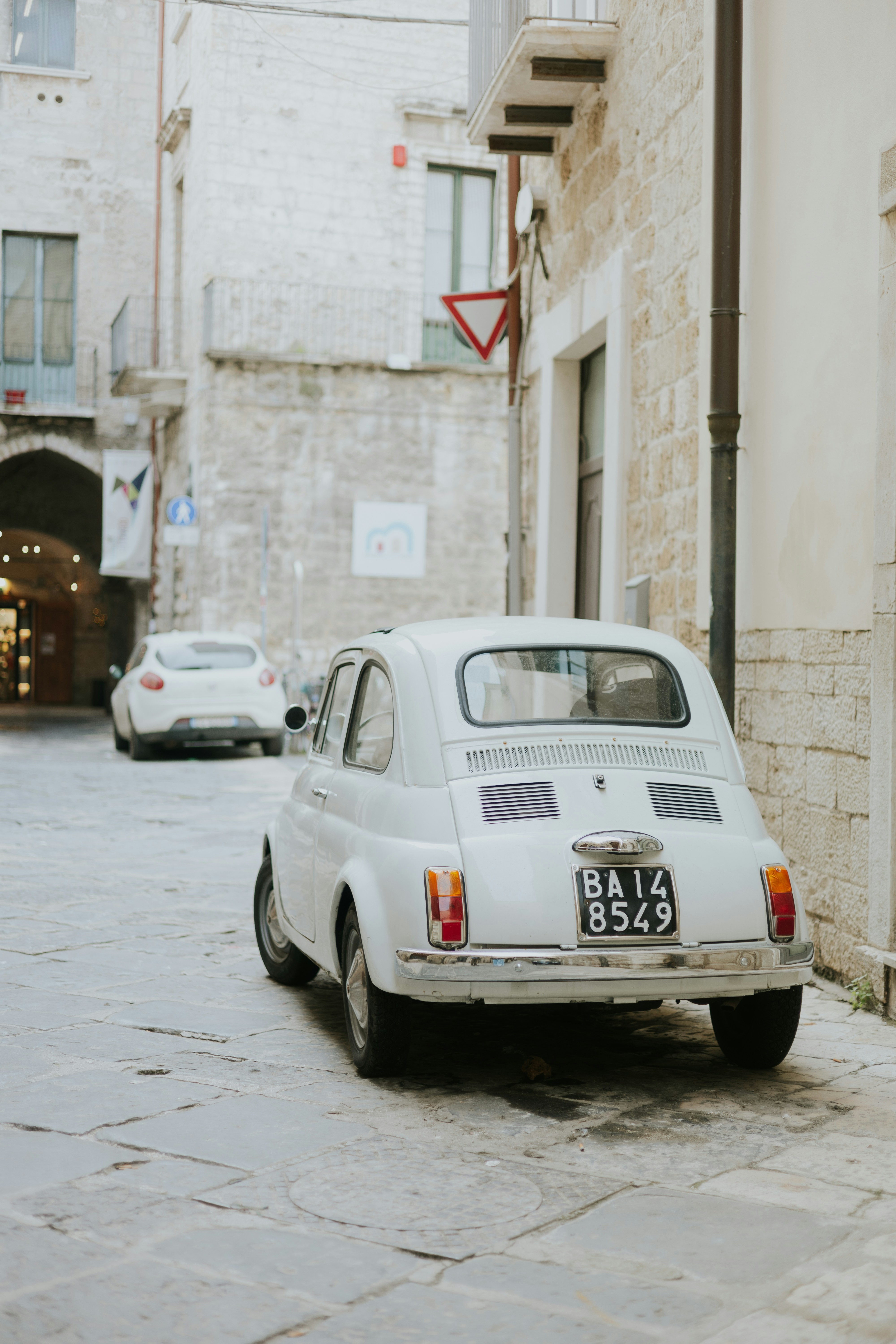 Pastel Pup Auto on a Narrow European Lane