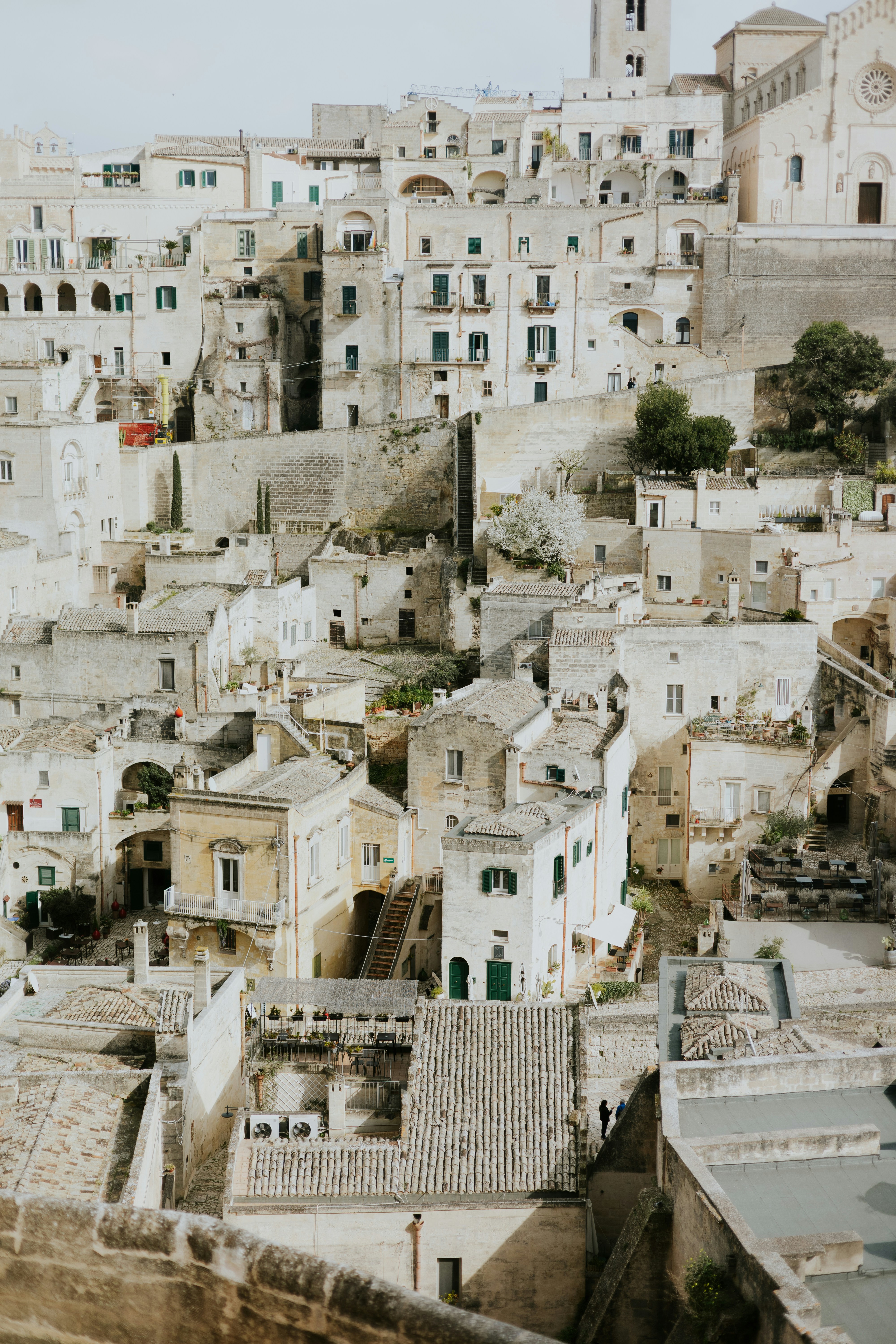 Sunlit limestone labyrinth: terraces and staircases of a hillside town
