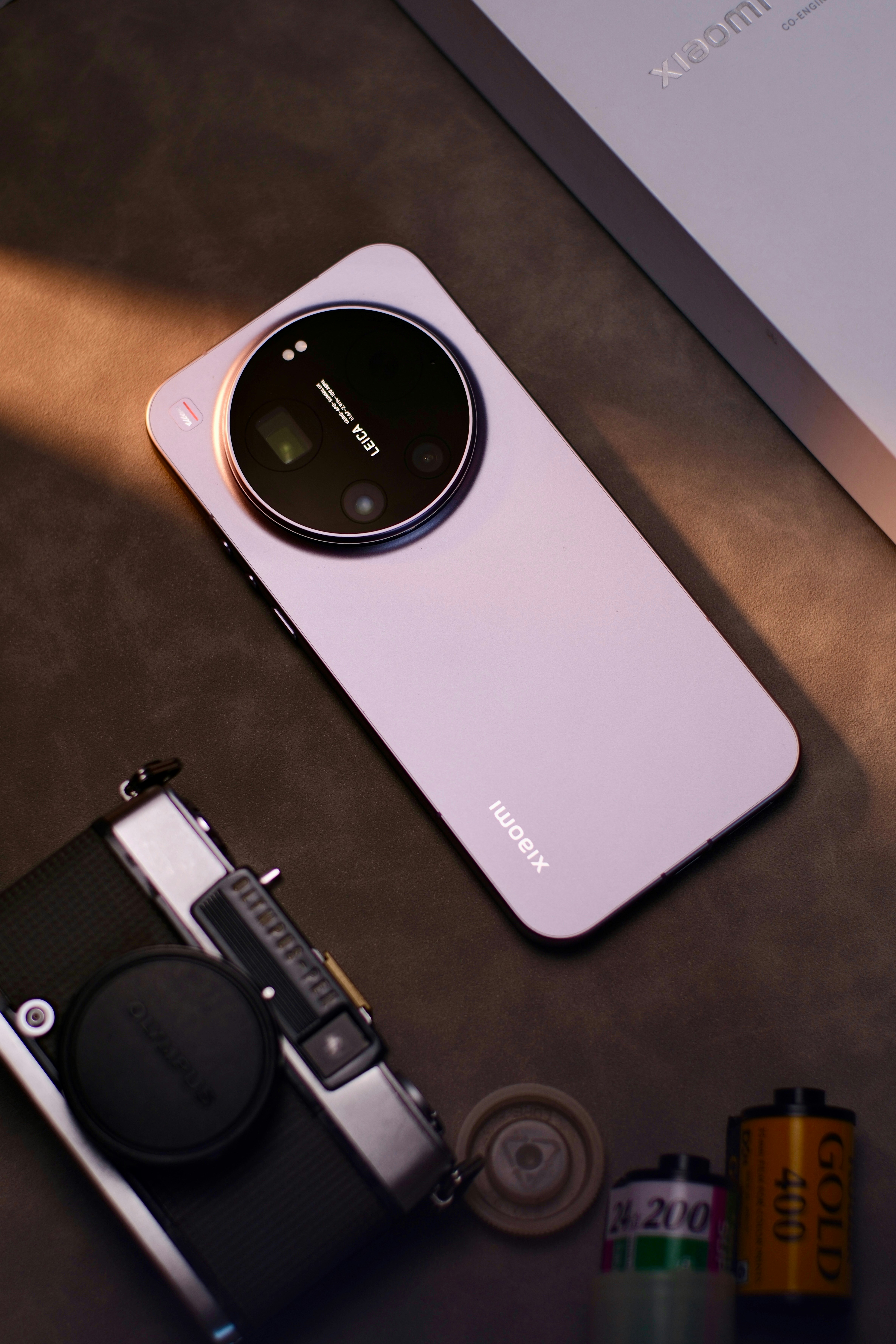 Pastel Portrait: The Xiaomi-esque Phone and Classic Rangefinder Duo