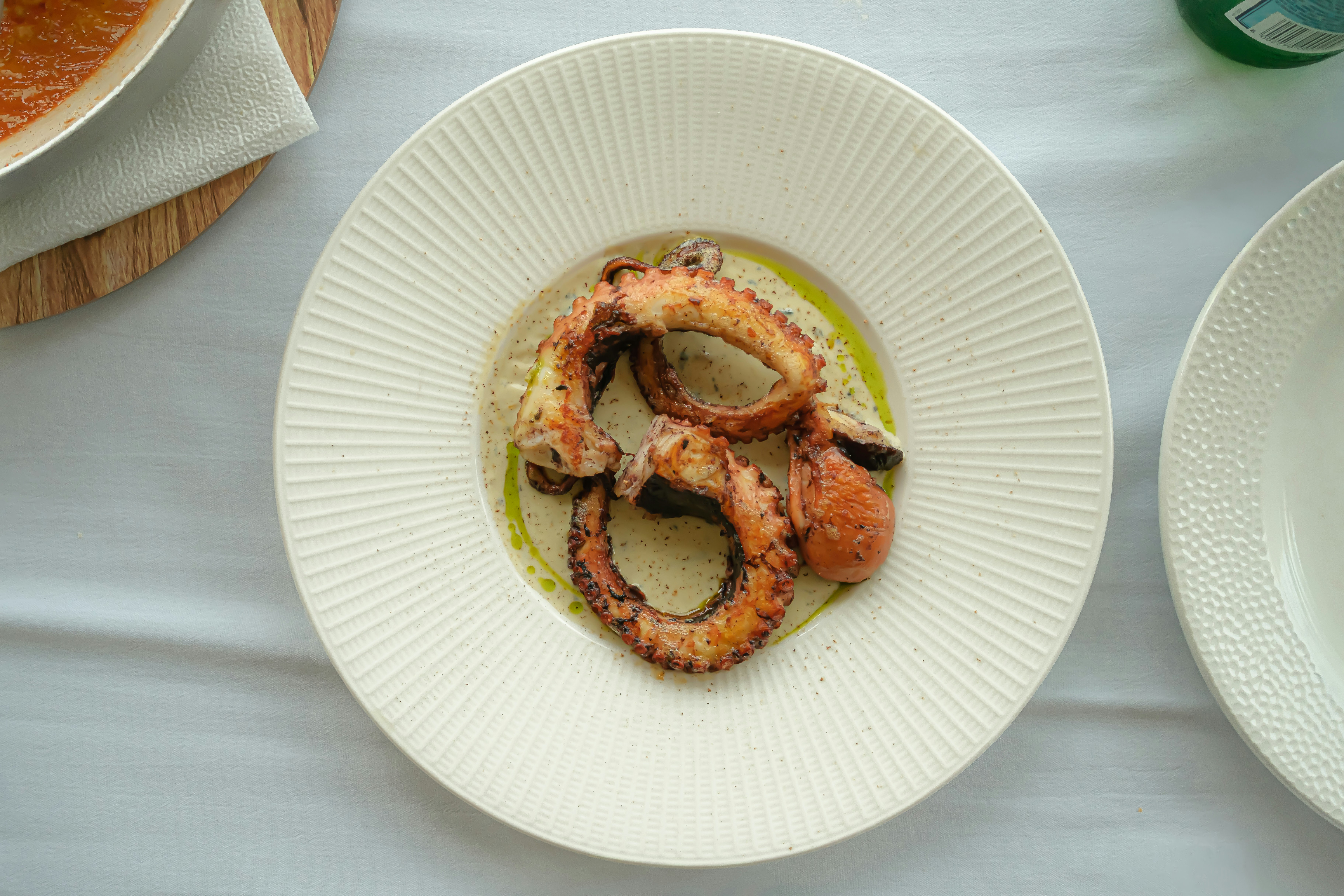 Octopus Rings on a Minimalist White Plate