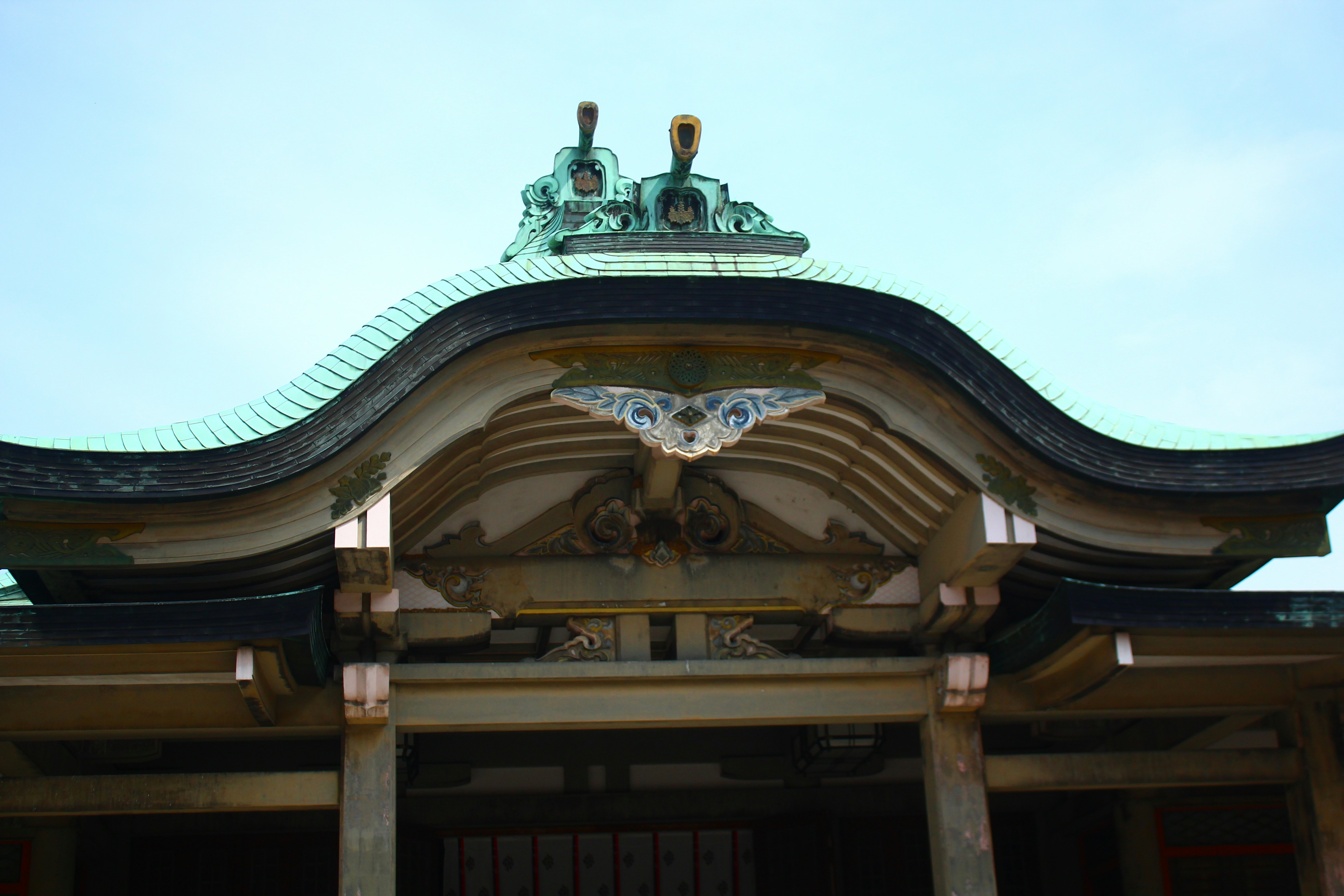 Temple Roof Crest Against Clear Sky