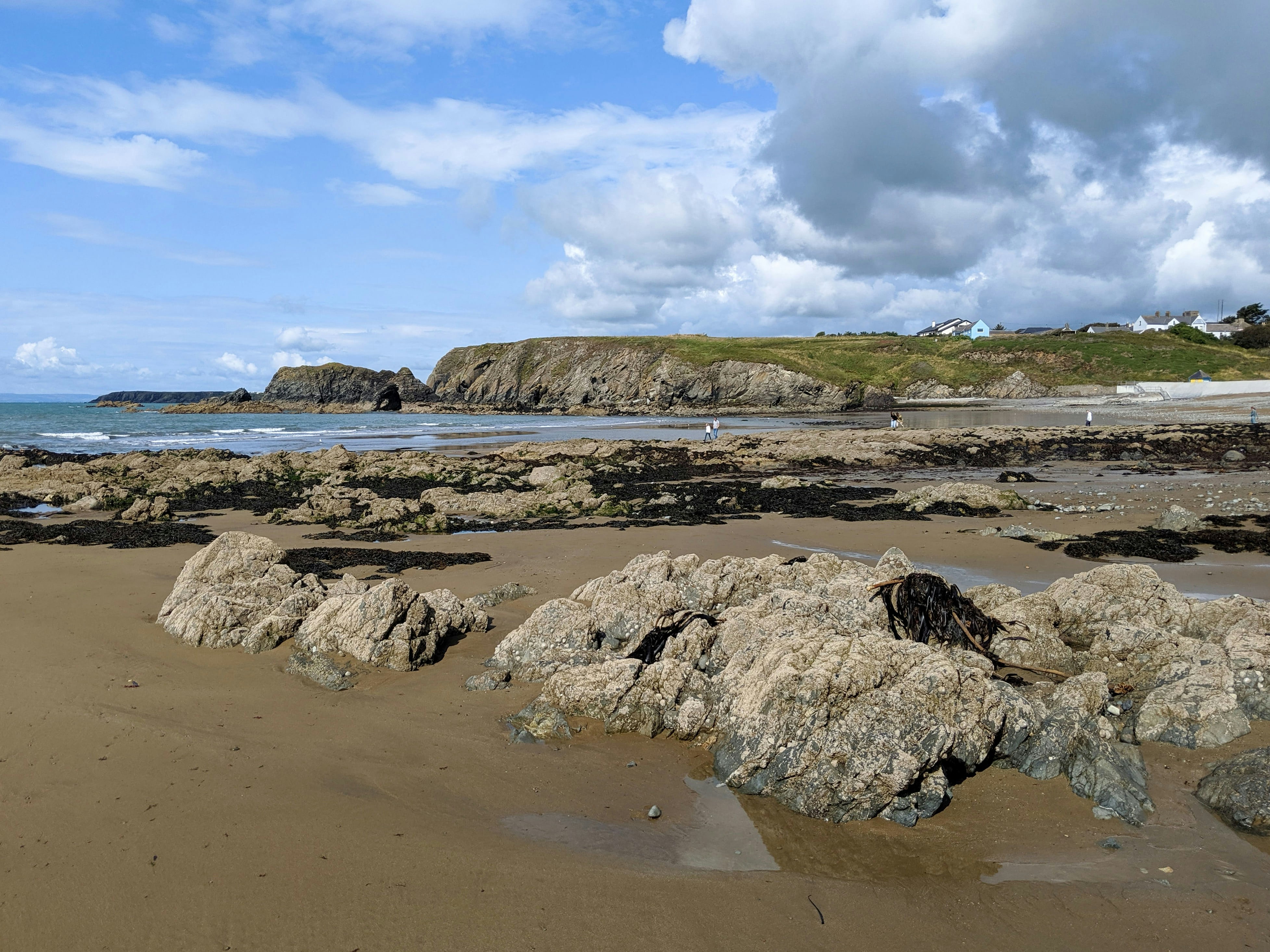 Coastal Rocks at Low Tide Under Wide Atlantic Sky