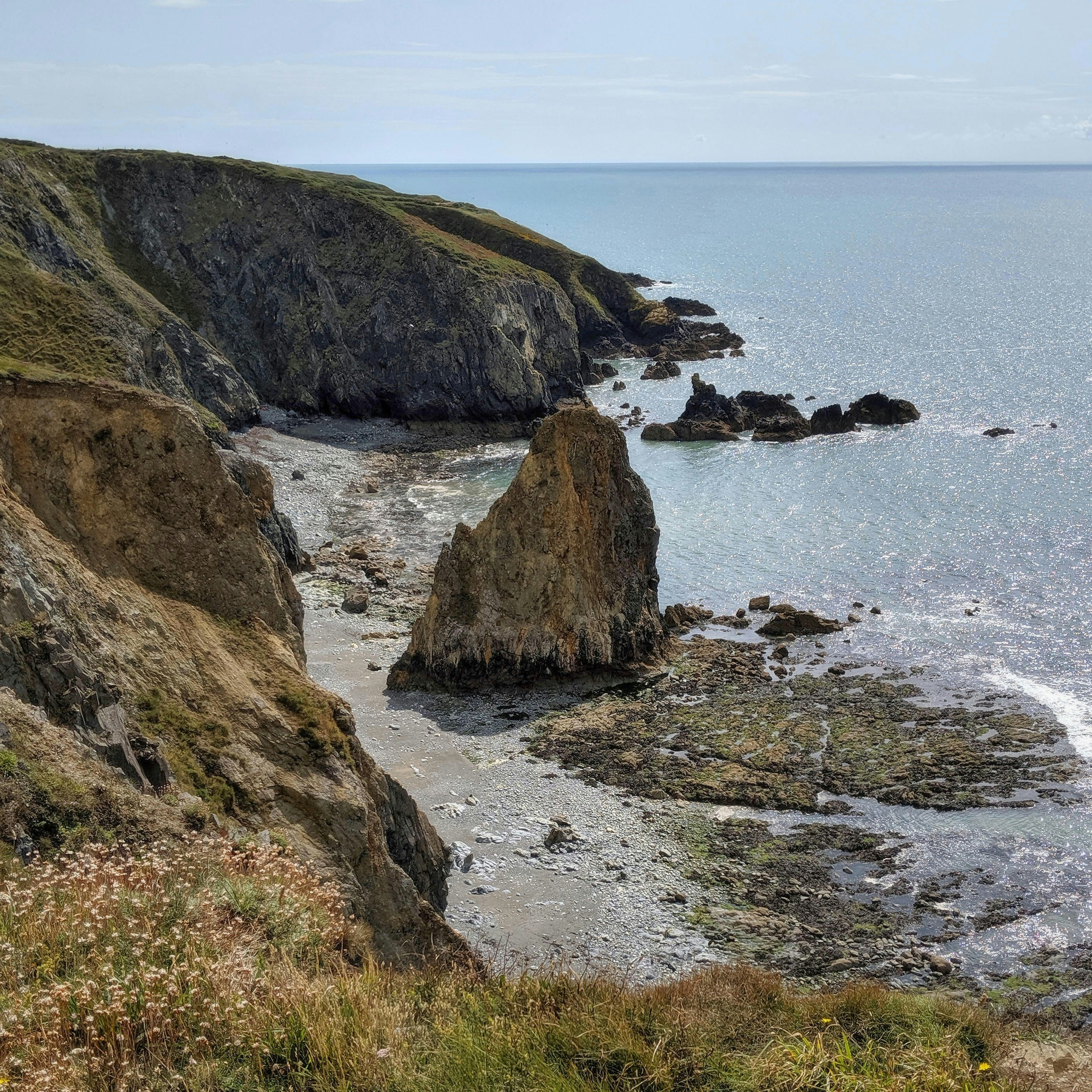 Coastal Sentinel: A Sea Cliff Overlooking Gentle Tides