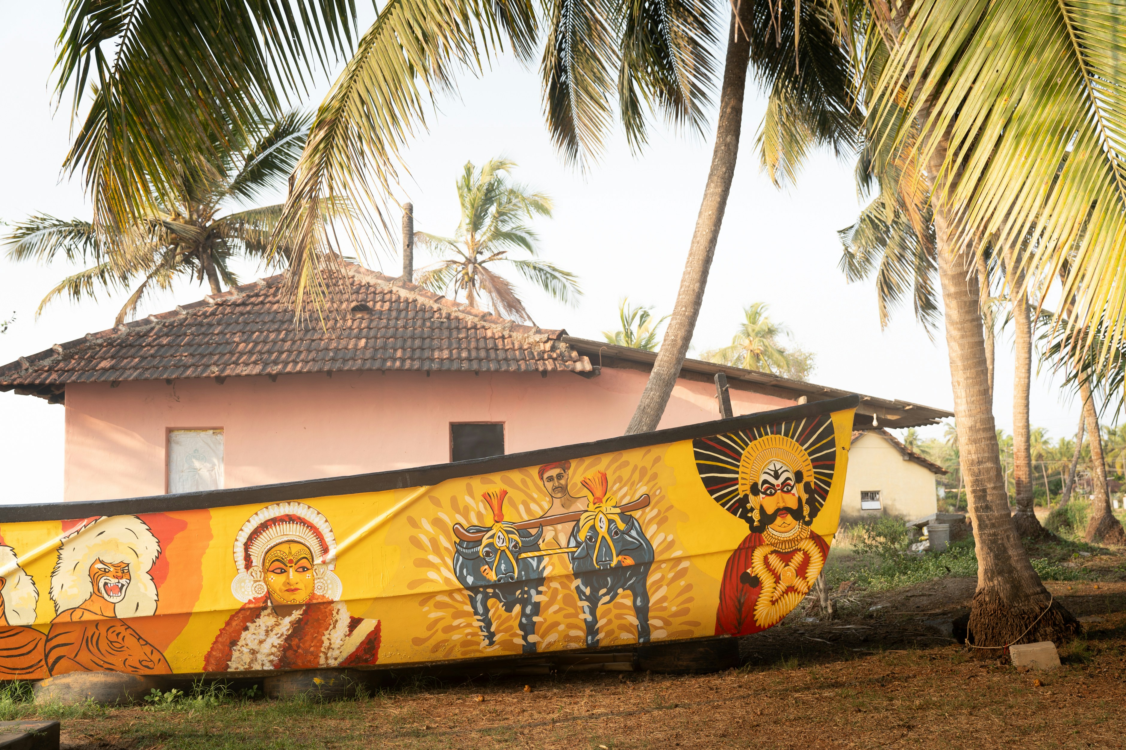 Sunlit Boat Murals Under Tropical Palms