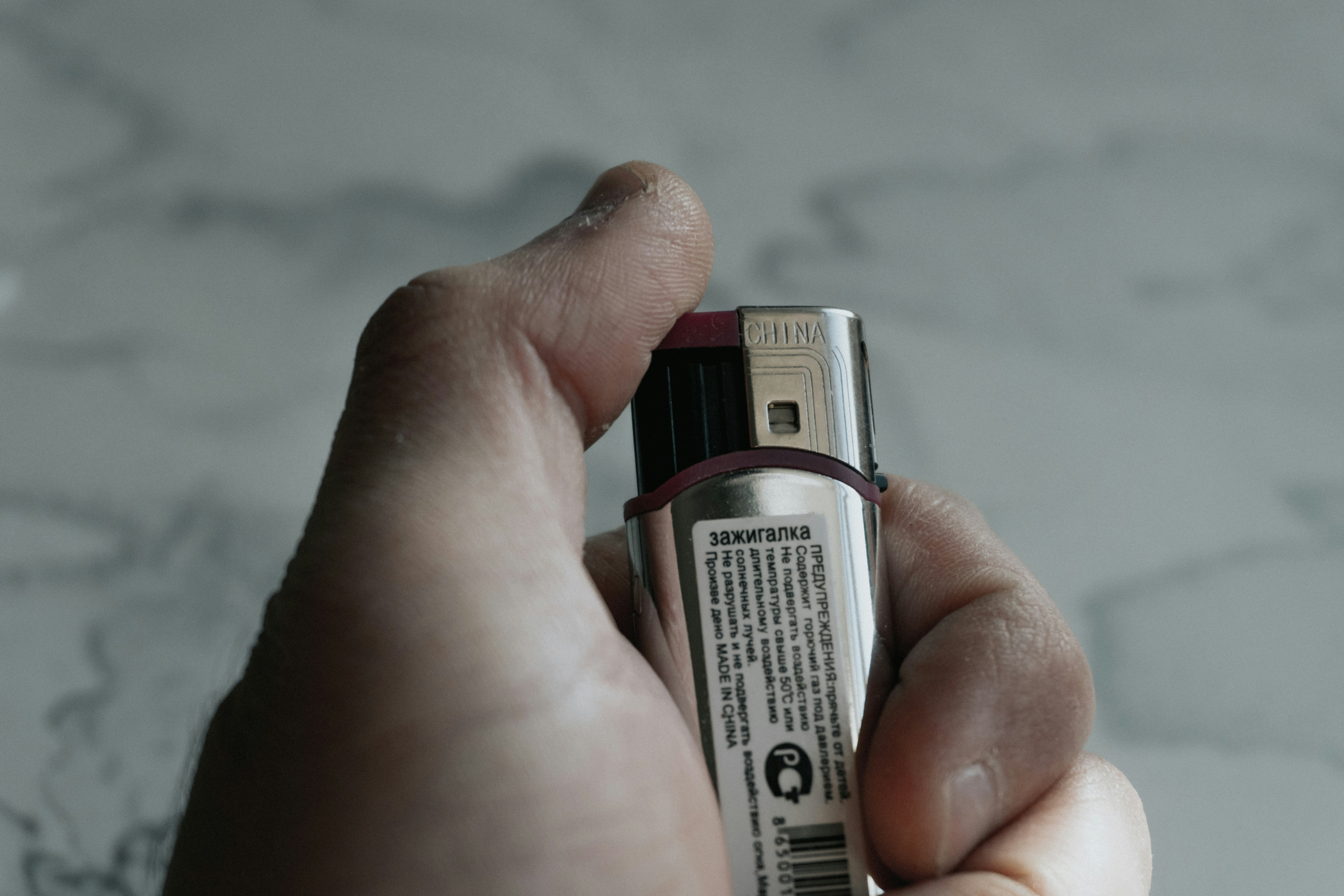 Close Grip: A Lighter Becomes the Center of Focus