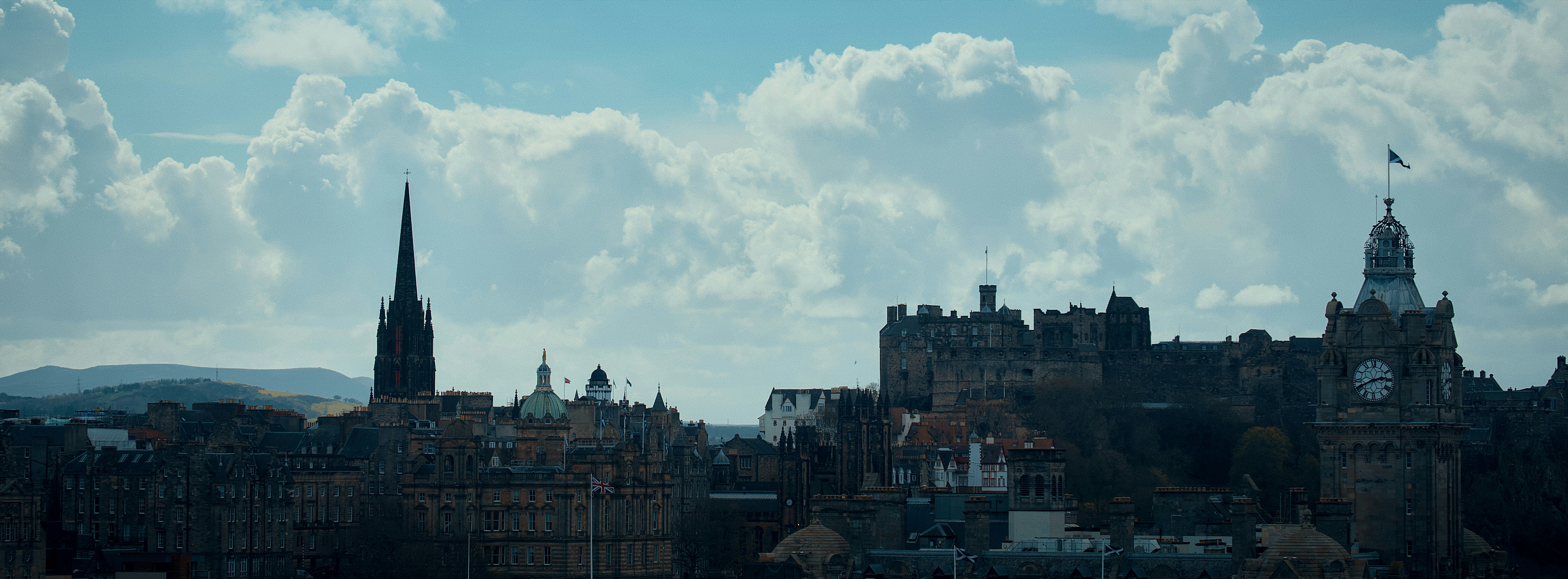 City Silhouette at Dusk: Spires and Fortunes