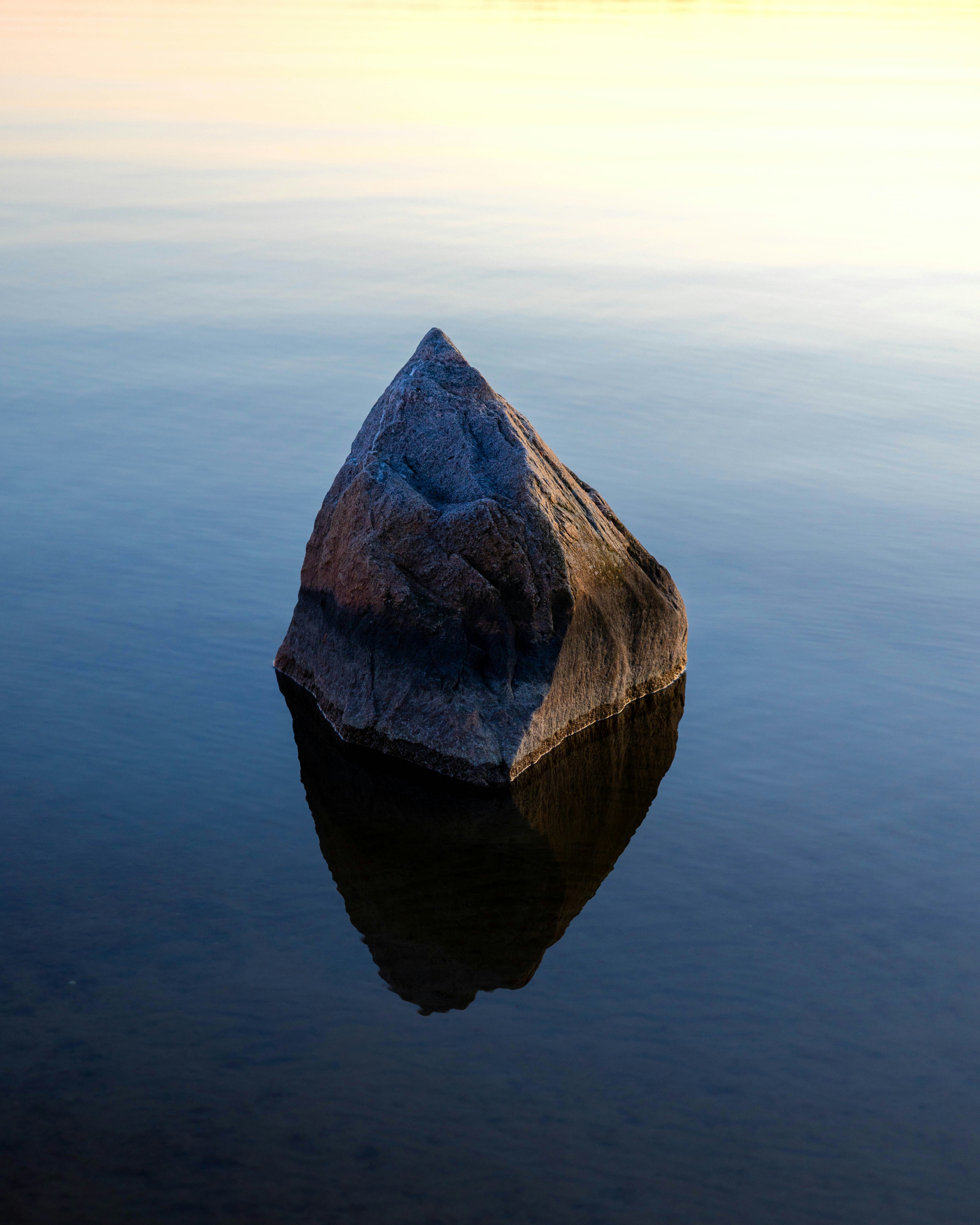 Lonely Granite Jewel Rising from Quiet Waters