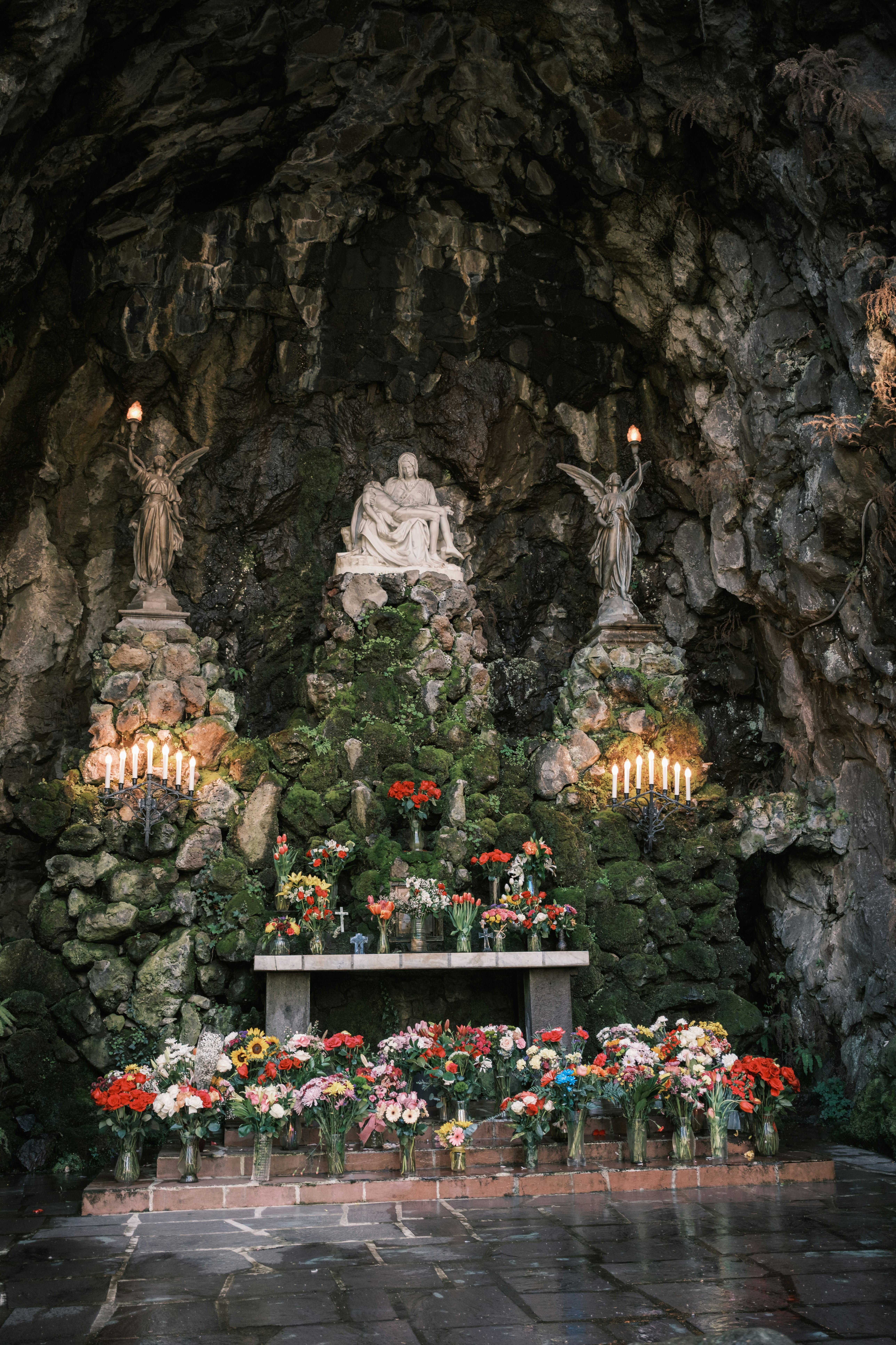 Candlelit Shrine Recess: Flowered Altar in a Mossy Cave