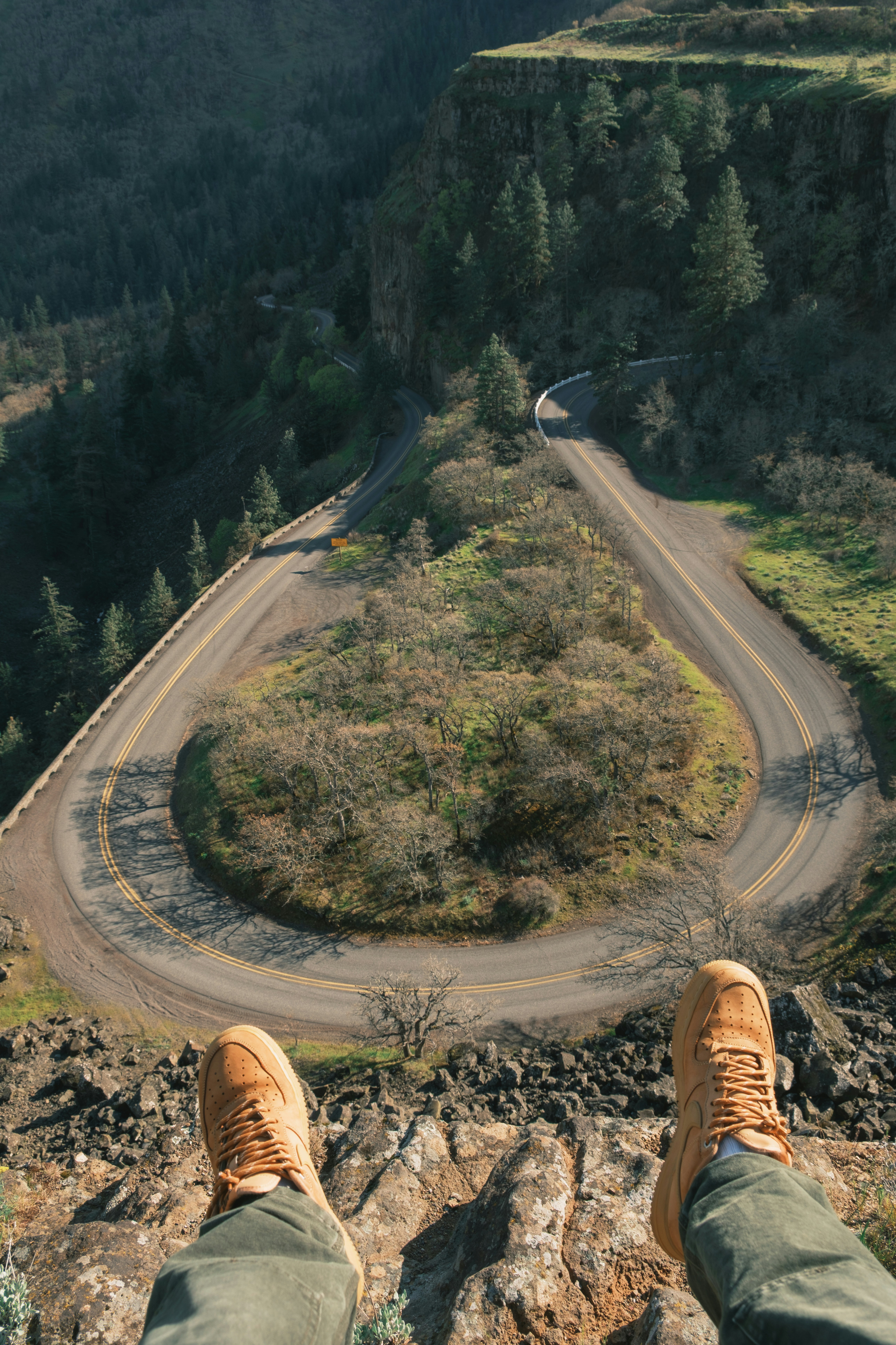 Hanging Over the Curve: Boots on the Edge of a Ribbon Road